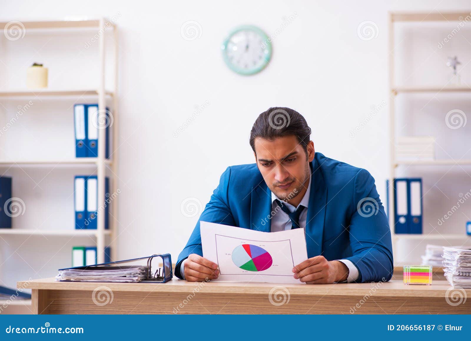 Young Male Sales Analyst Sitting in the Office Stock Image - Image of ...