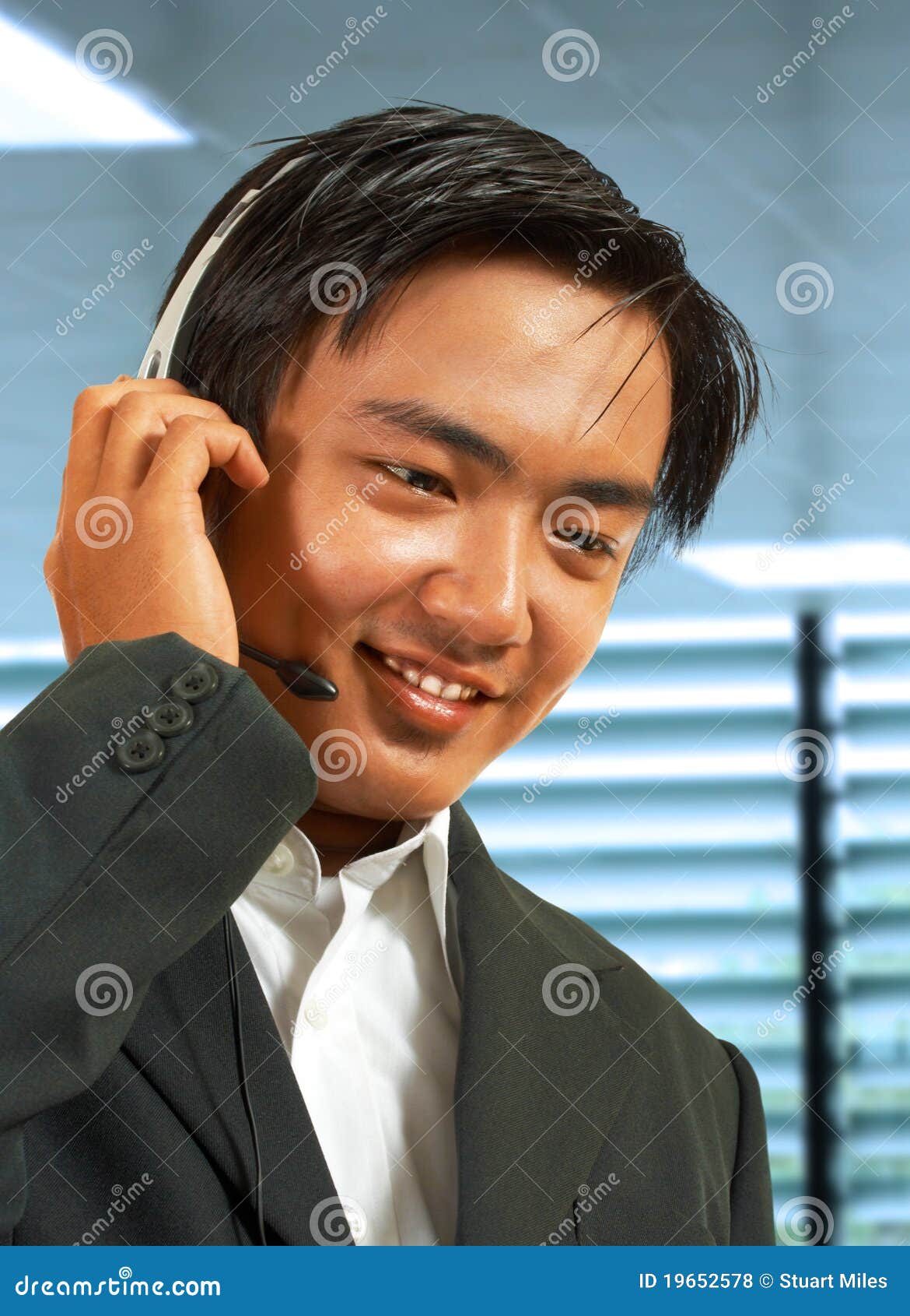 Male Sales Representative Talking on a Headset Stock Photo - Image of ...