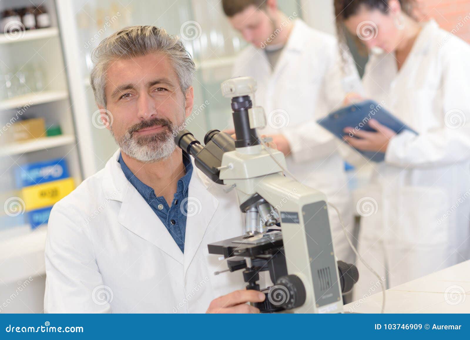 Male Scientific Researcher Using Microscope in Laboratory Stock Image ...