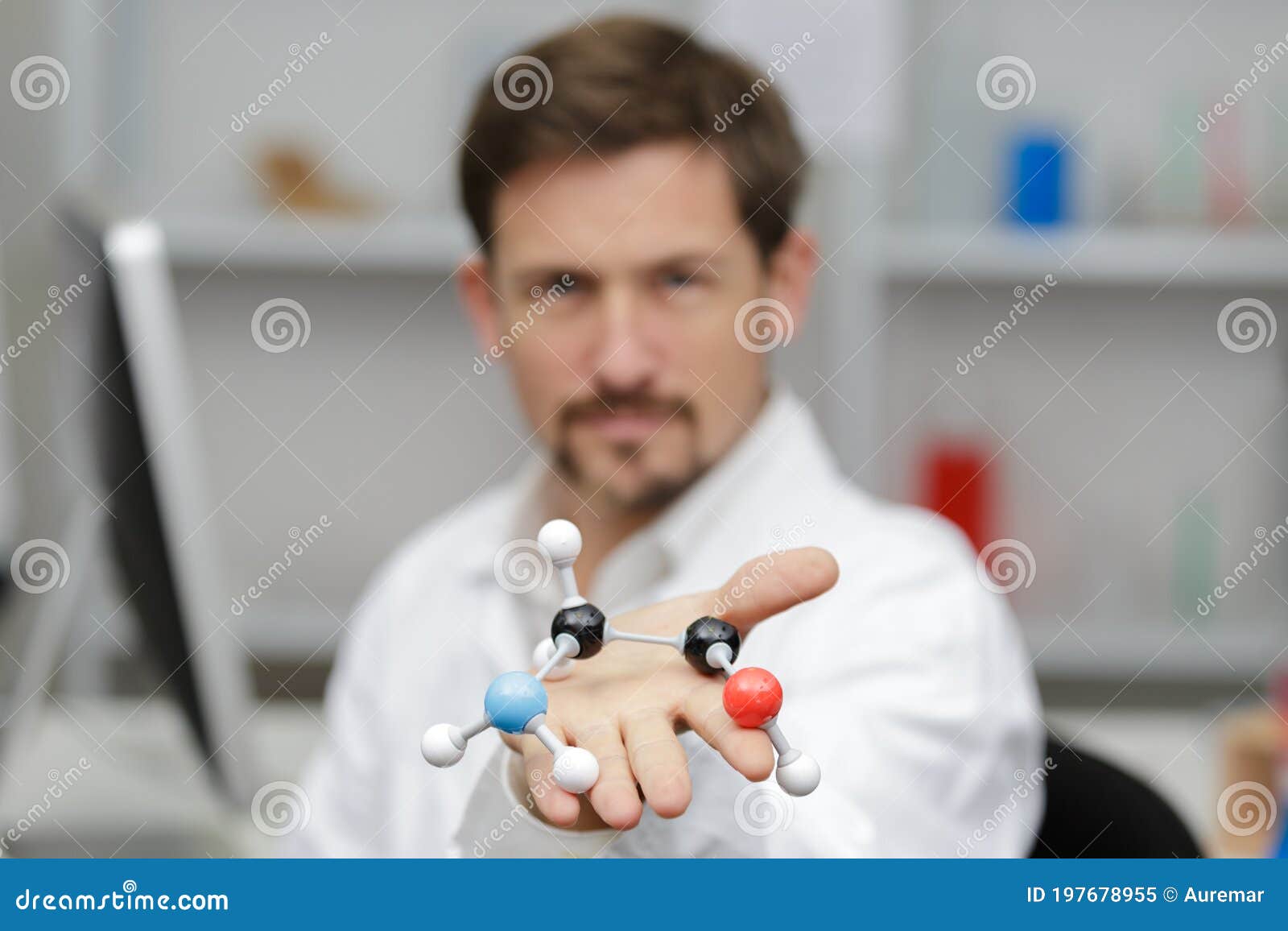 Male Scientist Holding Plastic Model in Outstretched Hand Stock Image ...