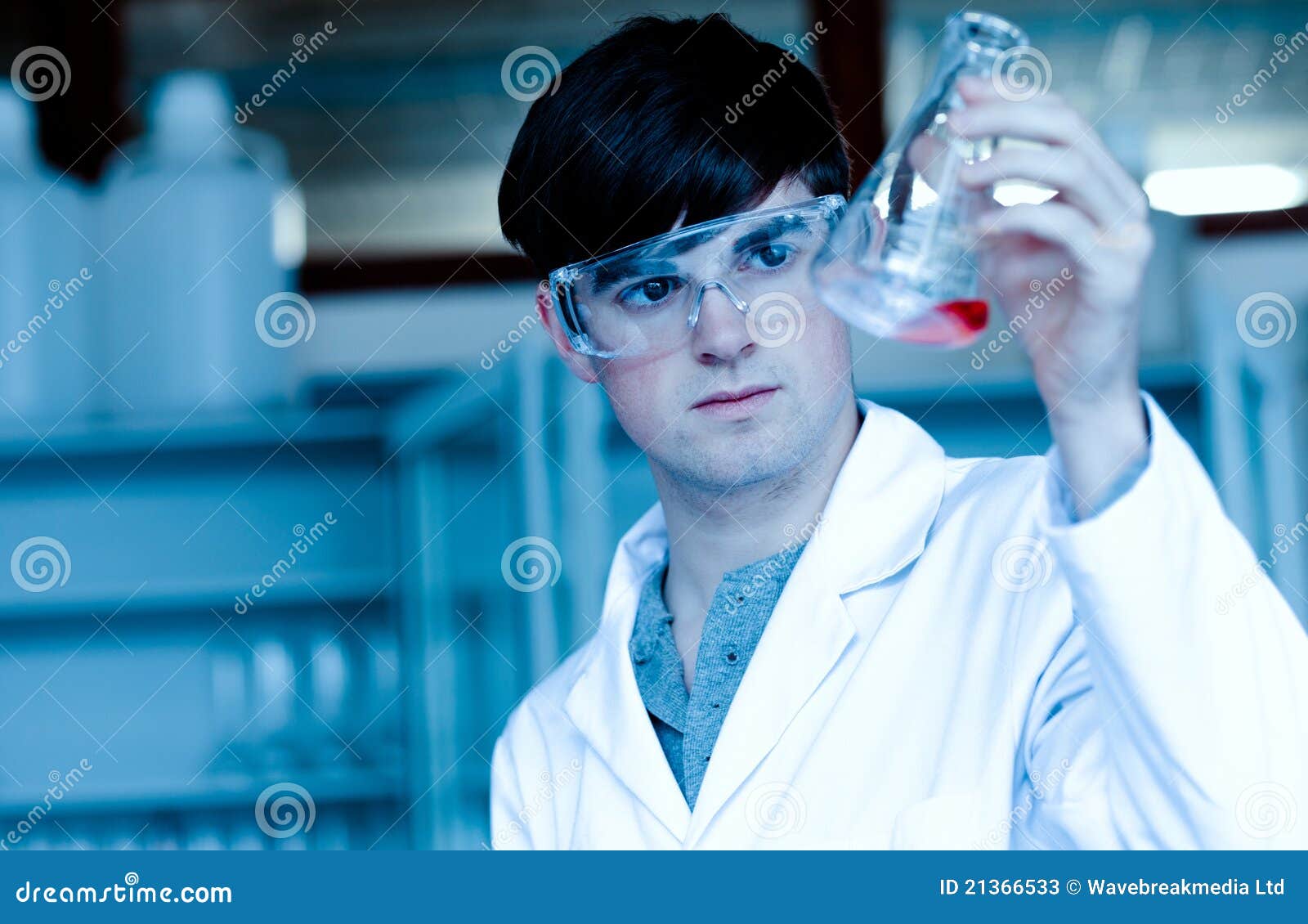 Male Scientist Looking at an Erlenmeyer Flask Stock Image - Image of ...