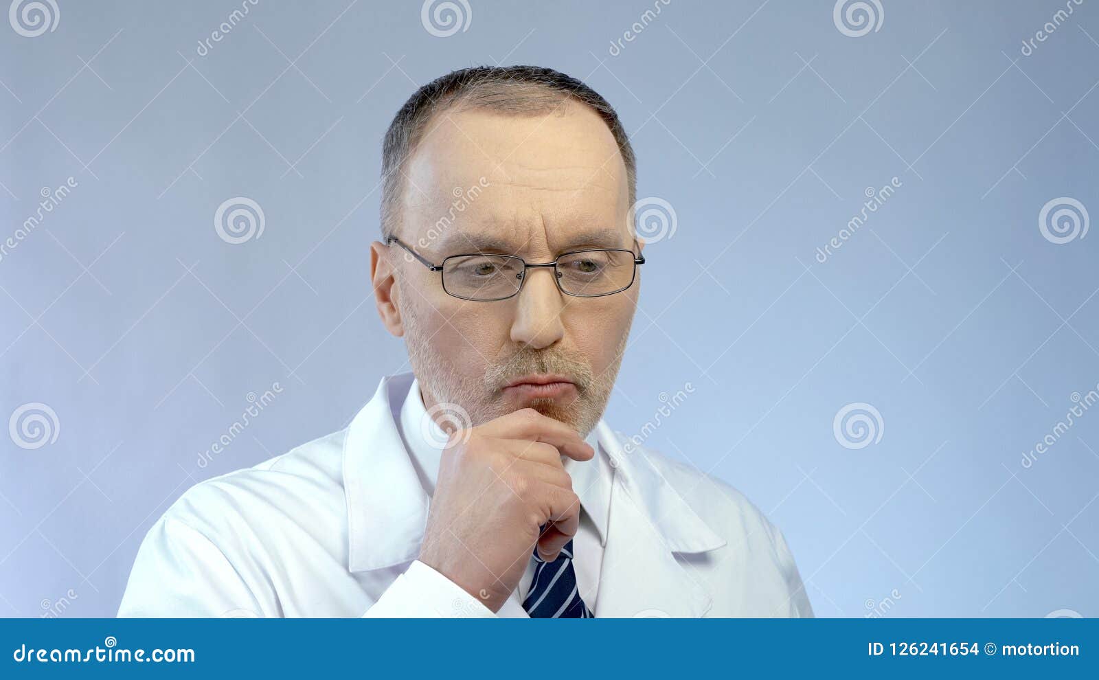 Male Scientist Thinking Over Project, Solving Problem in Medical ...