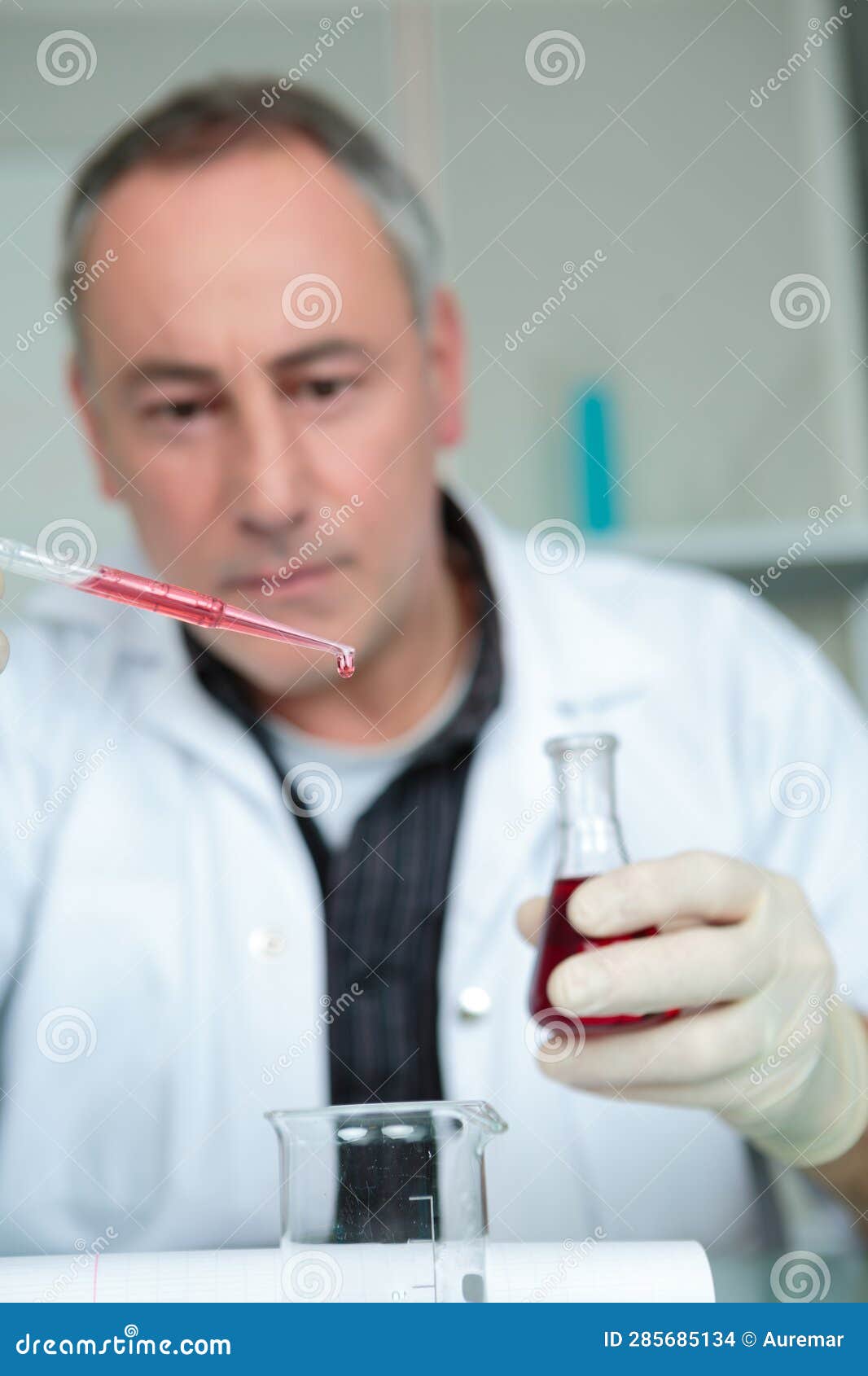 Male Scientist Using Chemistry Fluid for Research in Laboratory Stock ...