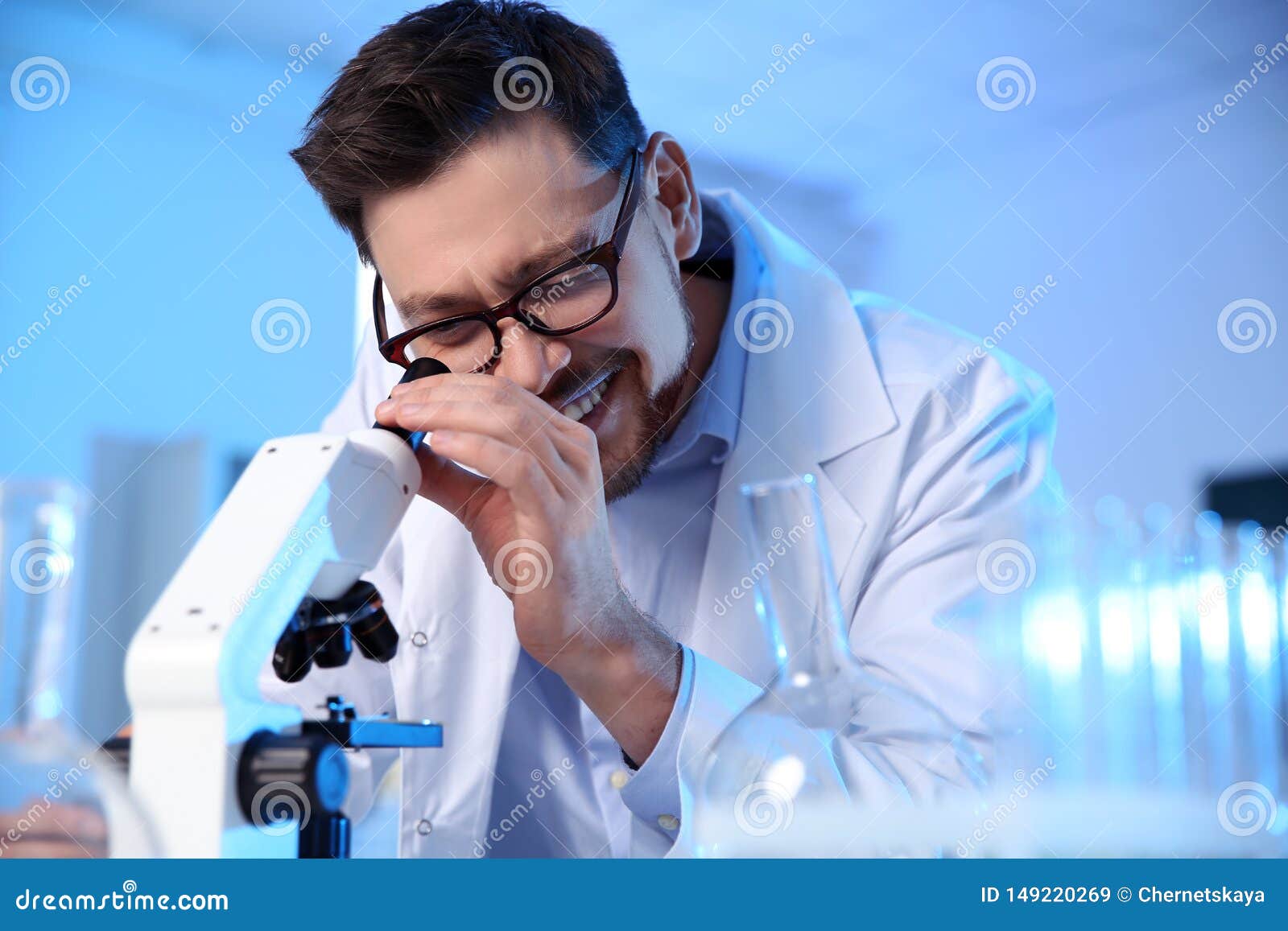 Male Scientist Using Microscope in Chemistry Laboratory Stock Image ...