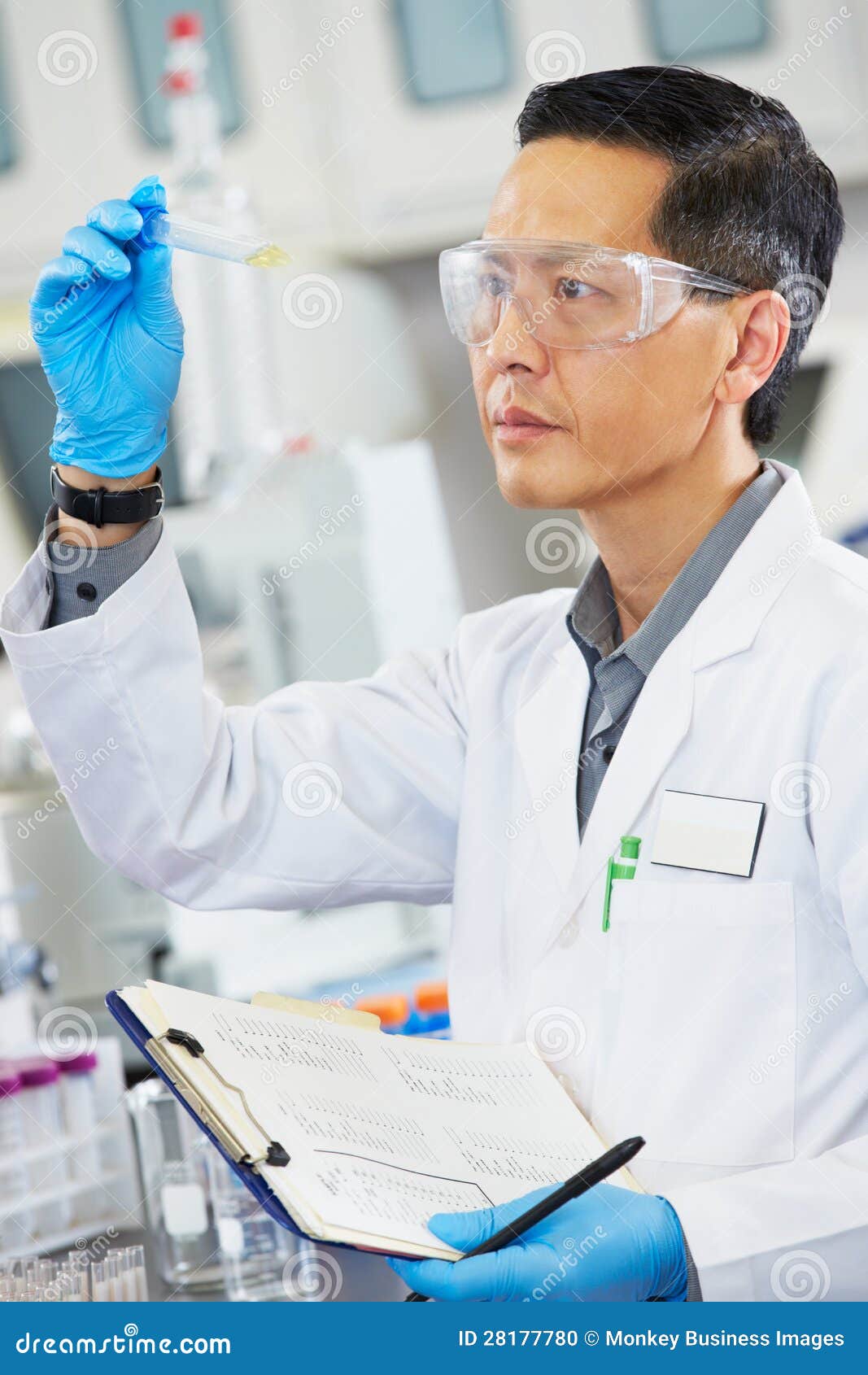 Male Scientist Working in Laboratory Stock Photo - Image of clipboard ...