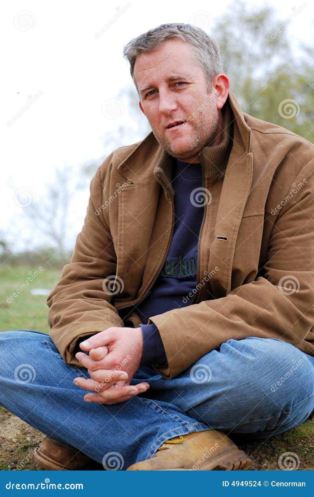 Male seated stock photo. Image of look, legs, search, seek - 4949524