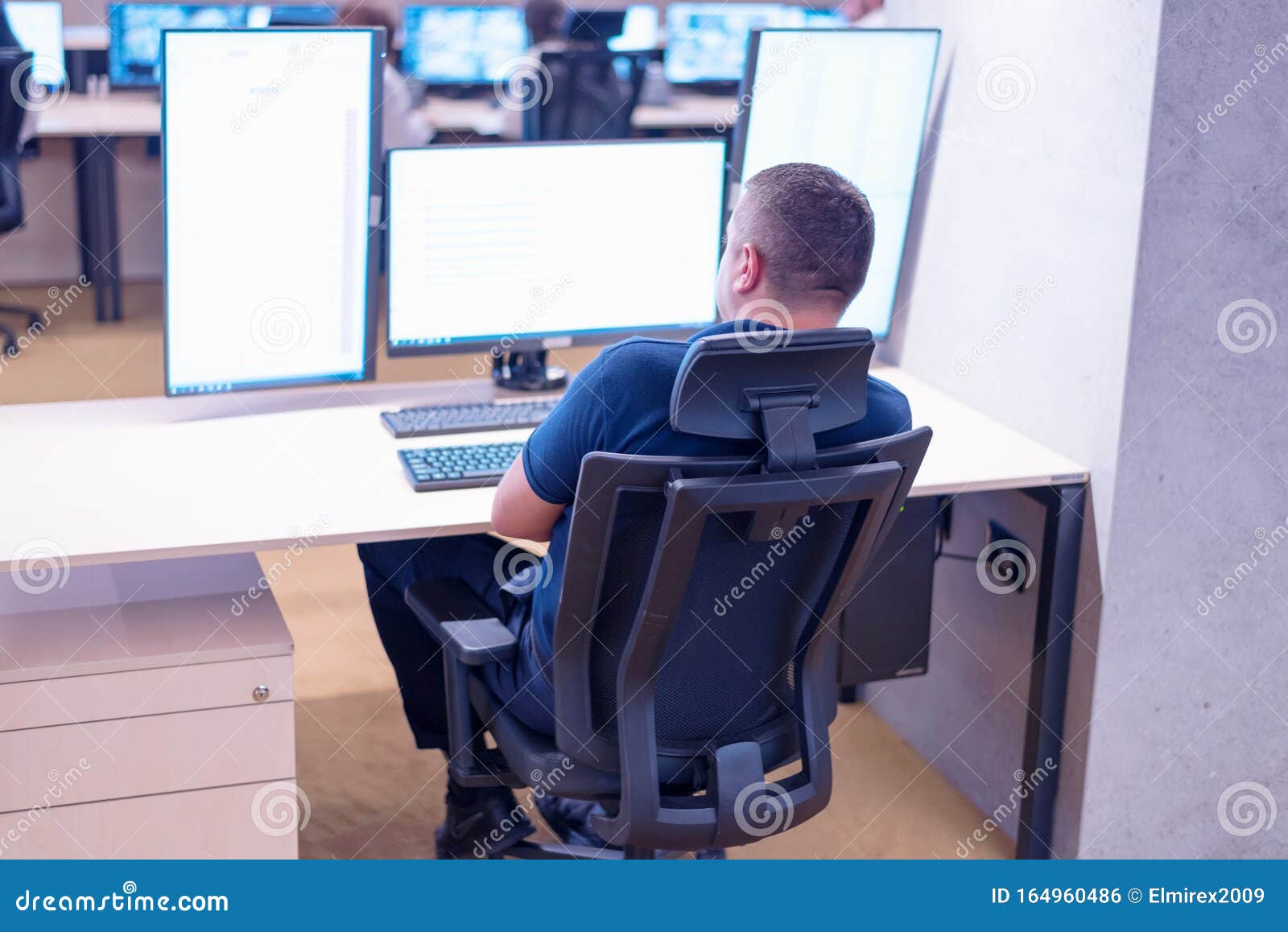 Male Security Guard Operator Talking on the Phone, Calling in the ...