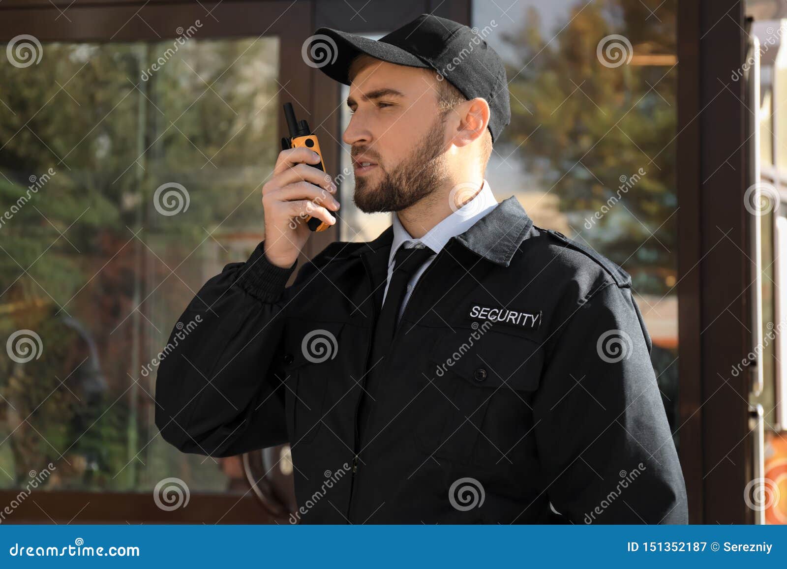 Male Security Guard with Portable Radio Transmitter Outdoors Stock ...