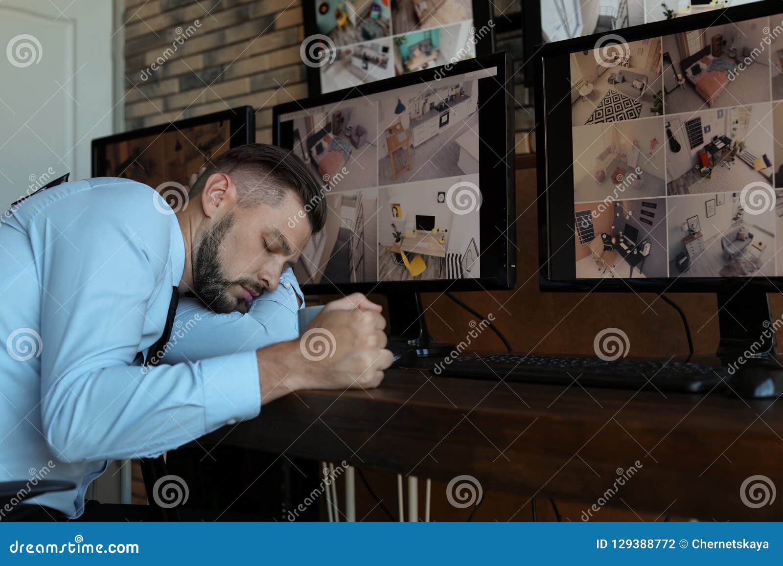Male Security Guard Sleeping at Workplace. Stock Photo - Image of ...