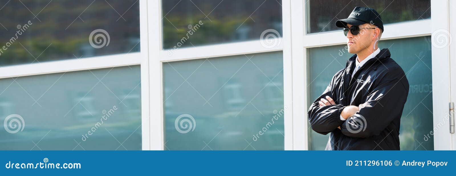 Male Security Guard Standing at the Entrance Stock Photo - Image of ...