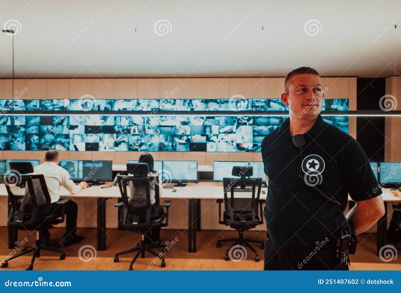 Male Security Operator Working in a Data System Control Room Offices ...