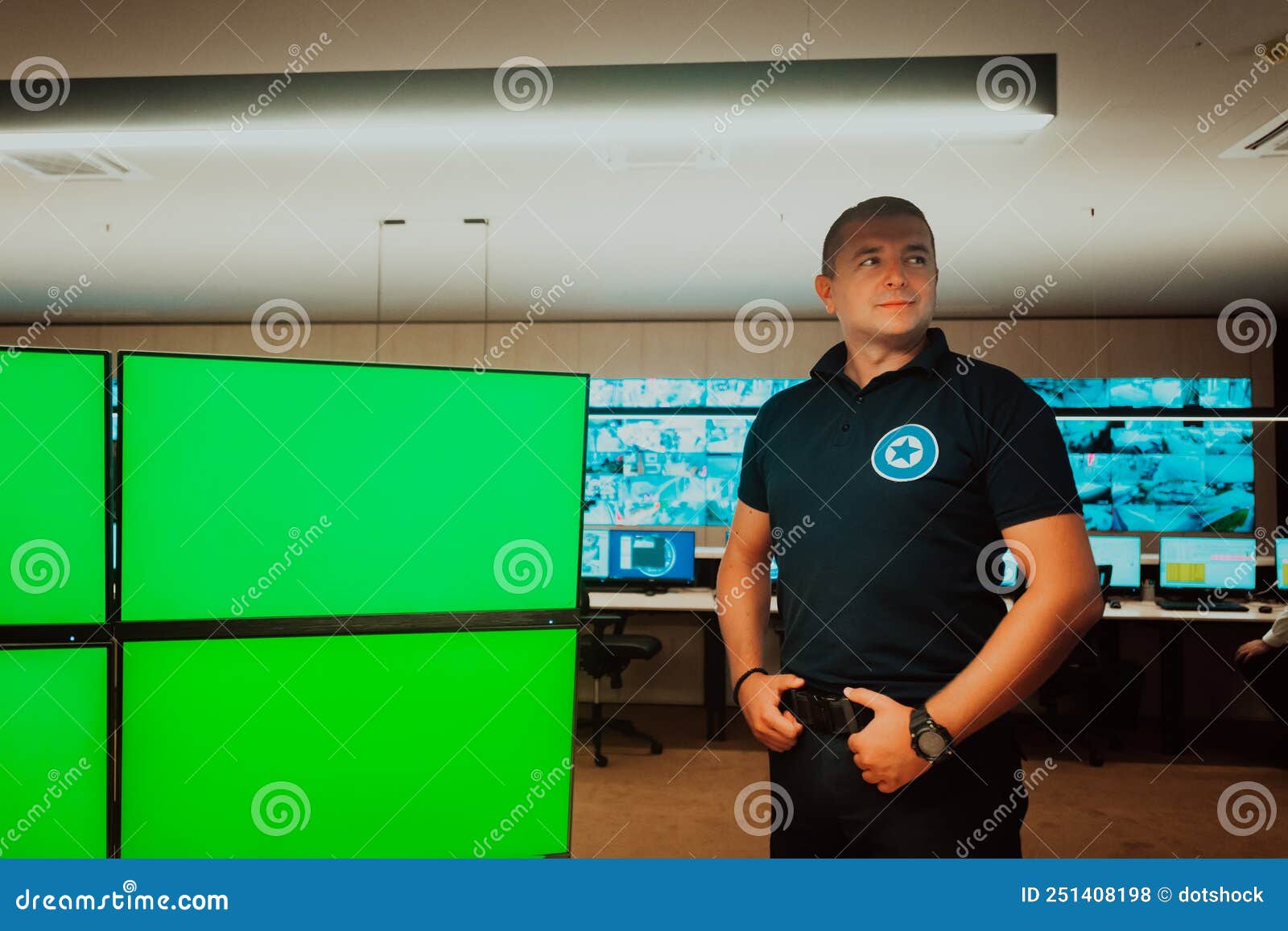 Male Security Operator Working in a Data System Control Room Offices ...