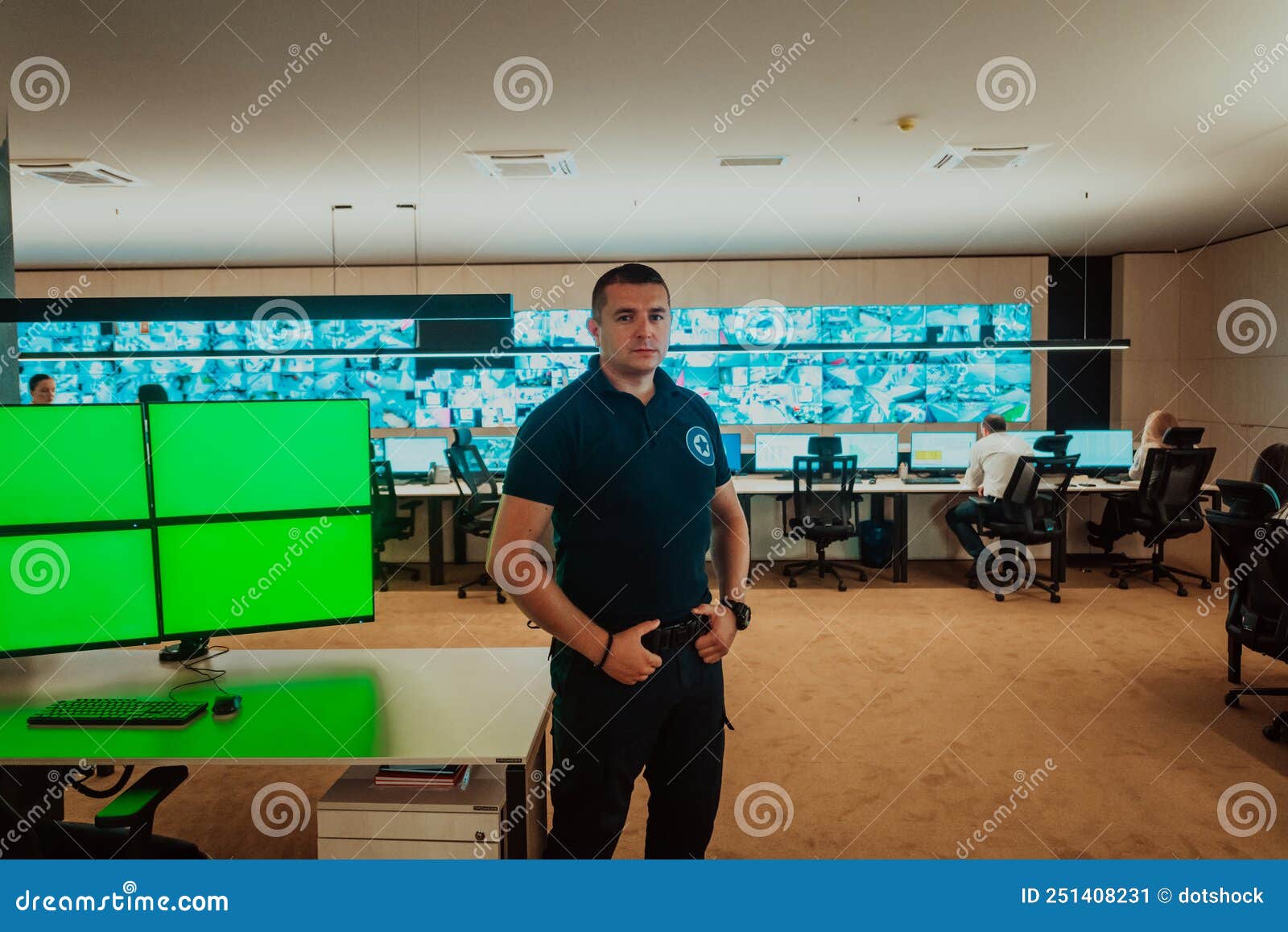 Male Security Operator Working in a Data System Control Room Offices ...
