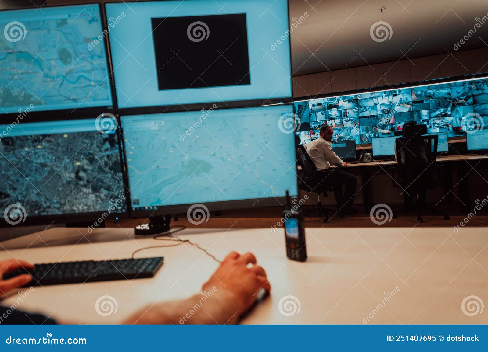 Male Security Operator Working in a Data System Control Room Offices ...