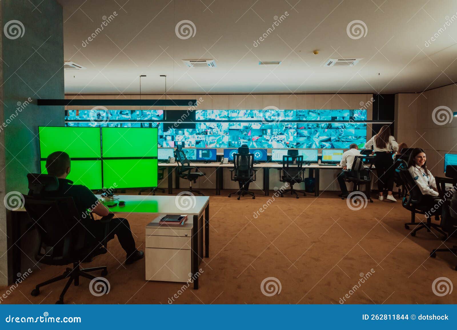Male Security Operator Working in a Data System Control Room Offices ...