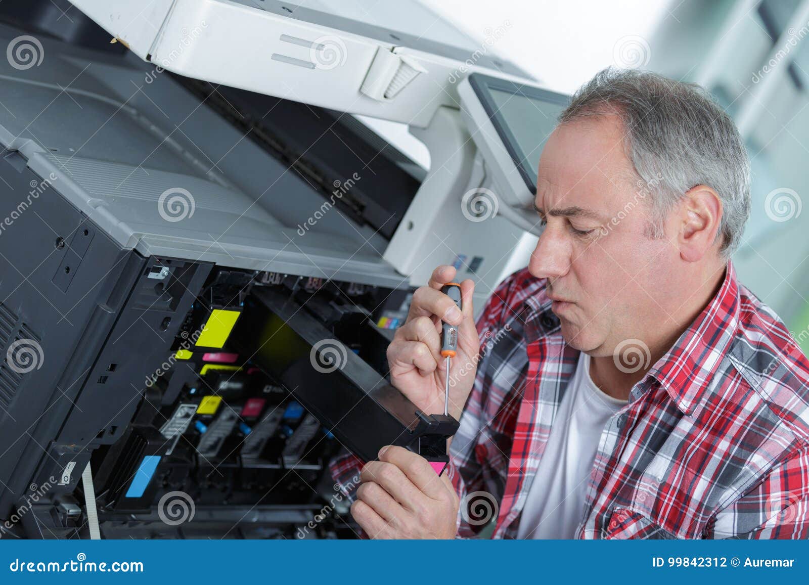 Male Senior Technician Repairing Printer at Office Stock Photo - Image ...