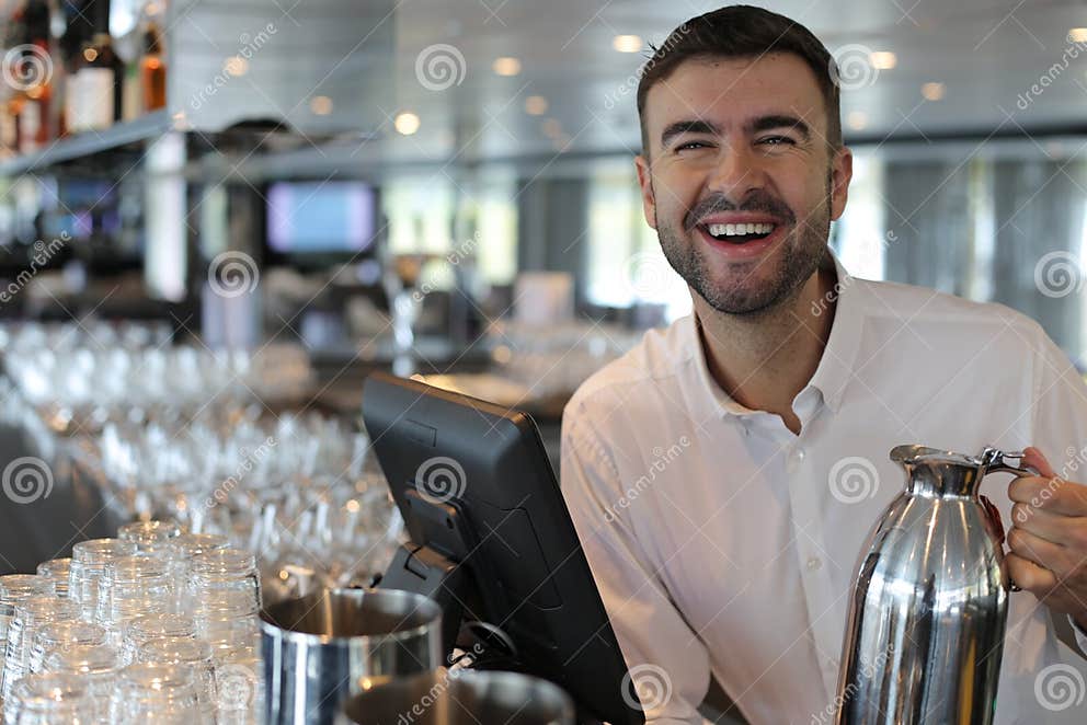 Male Server Smiling Behind the Counter Stock Image - Image of cafe ...