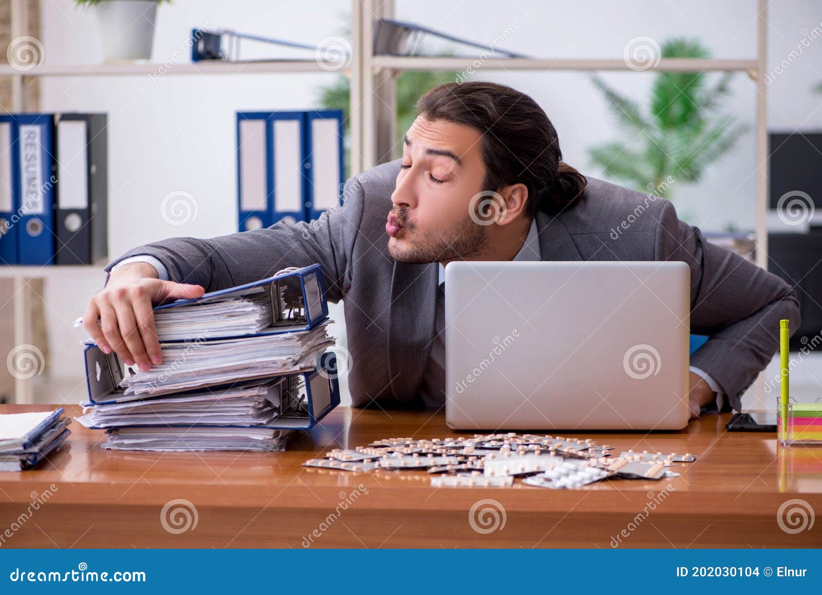 Young Male Sick Employee Suffering at Workplace Stock Photo - Image of ...
