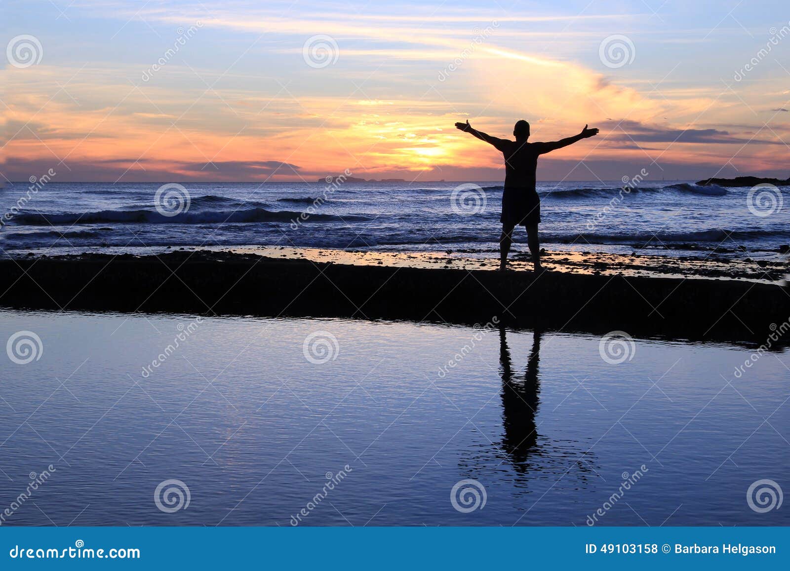 Male silhouette at sunset. stock photo. Image of oneness - 49103158