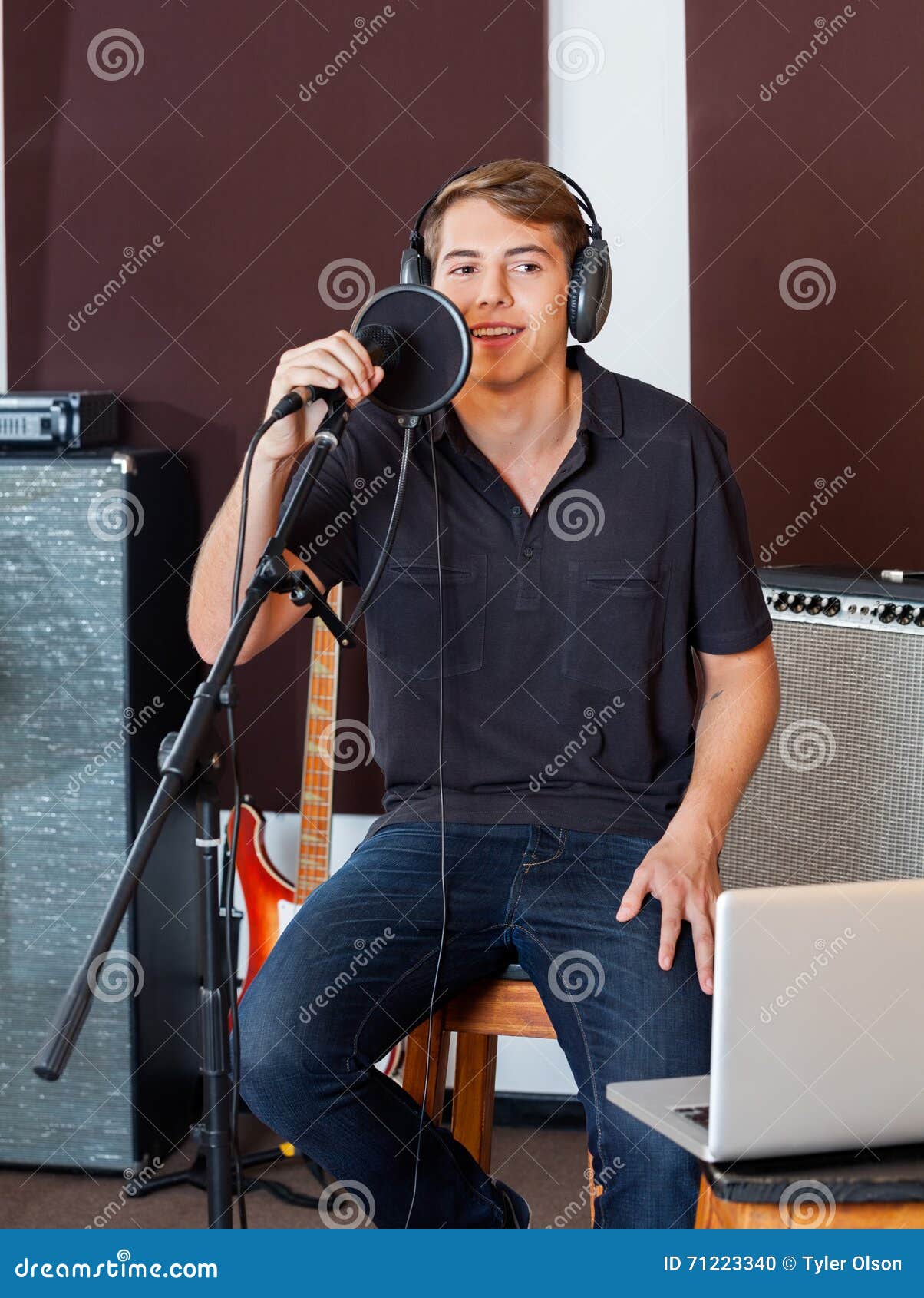 Male Singer in Casuals Performing at Recording Studio Stock Photo ...