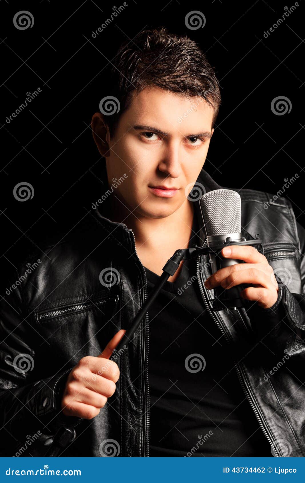 Male Singer Holding a Microphone Stock Photo - Image of music ...