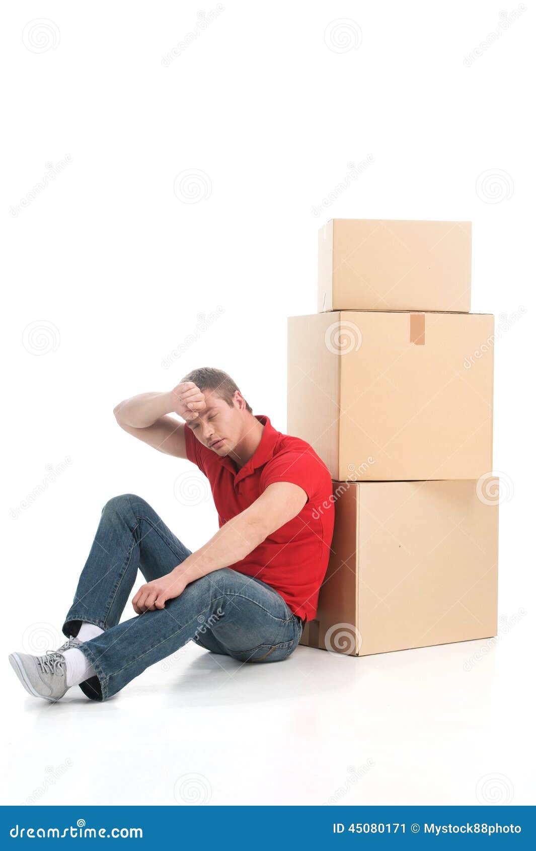 Male Sitting on Floor Tired of Moving Boxes. Stock Image - Image of ...