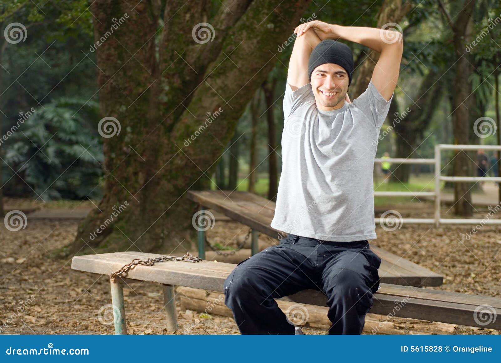 Male Smiling while Stretching - Horizontal Stock Photo - Image of multi ...