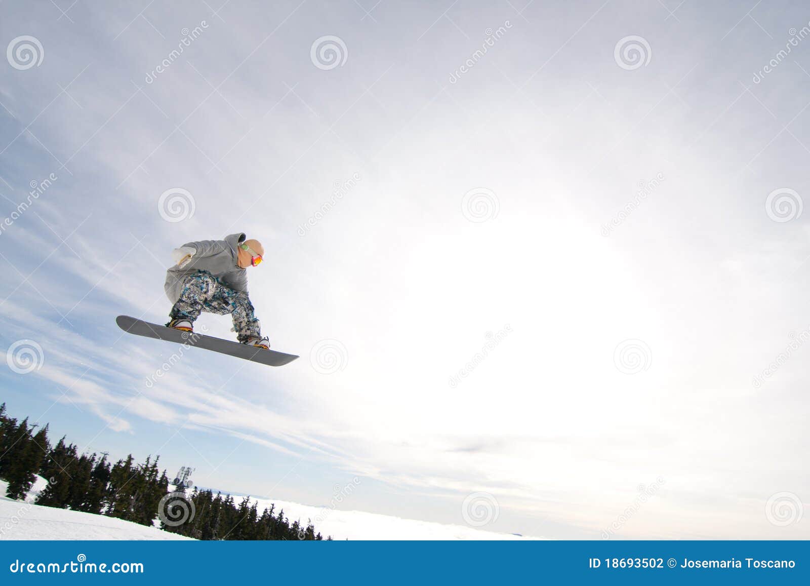 Male Snowboarder Catches Big Air. Stock Photo - Image of blue ...