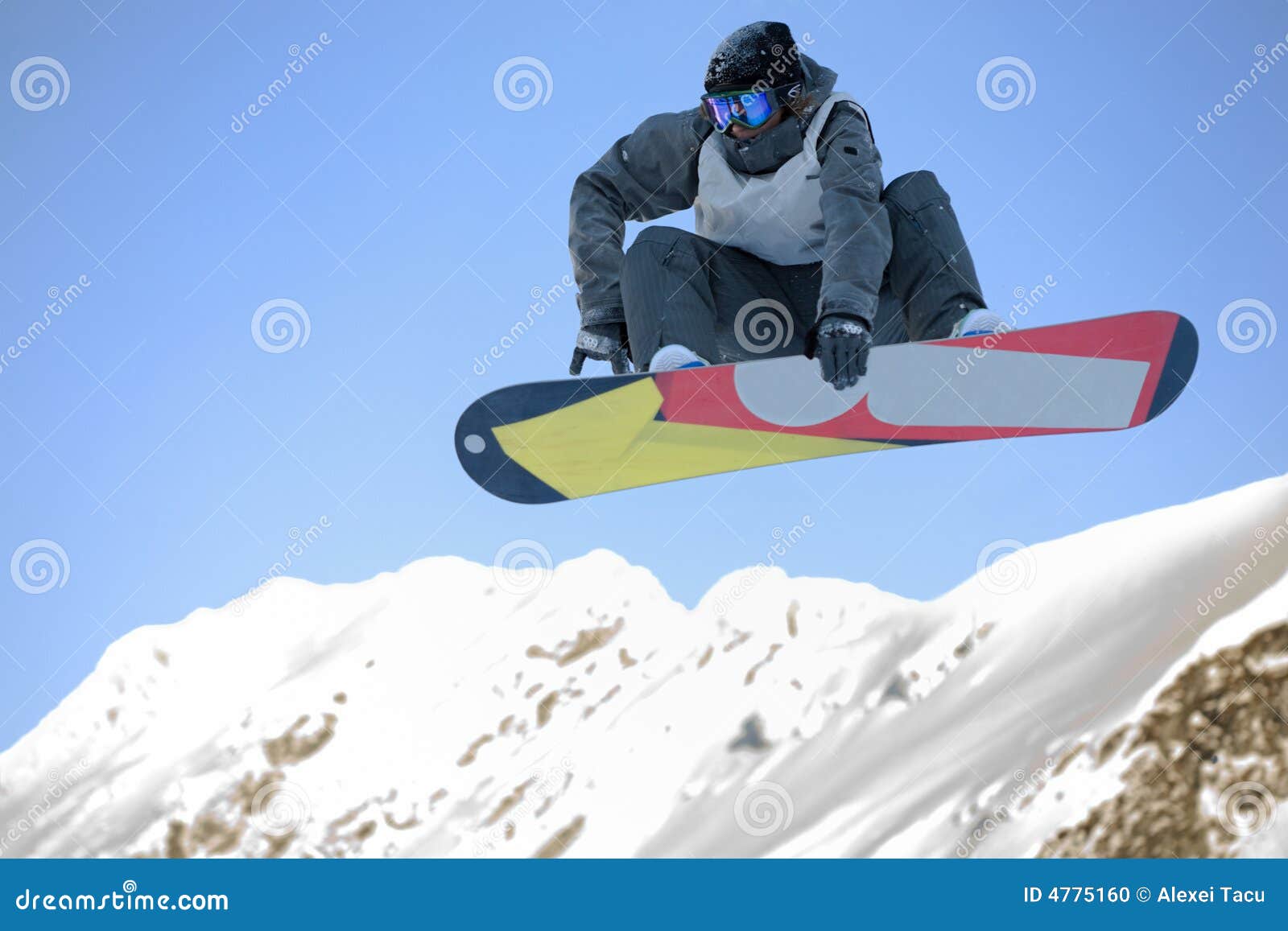Male Snowboarder Jumping with Snowboard Stock Photo - Image of action ...