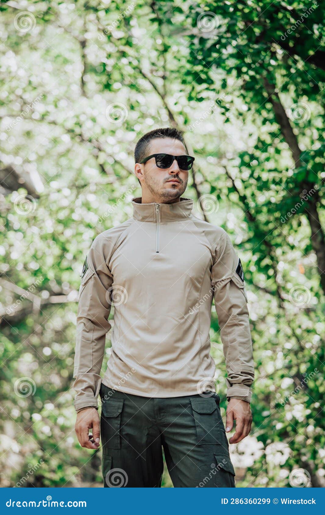 Male Soldier in a Military Uniform Standing with a Neutral Expression ...