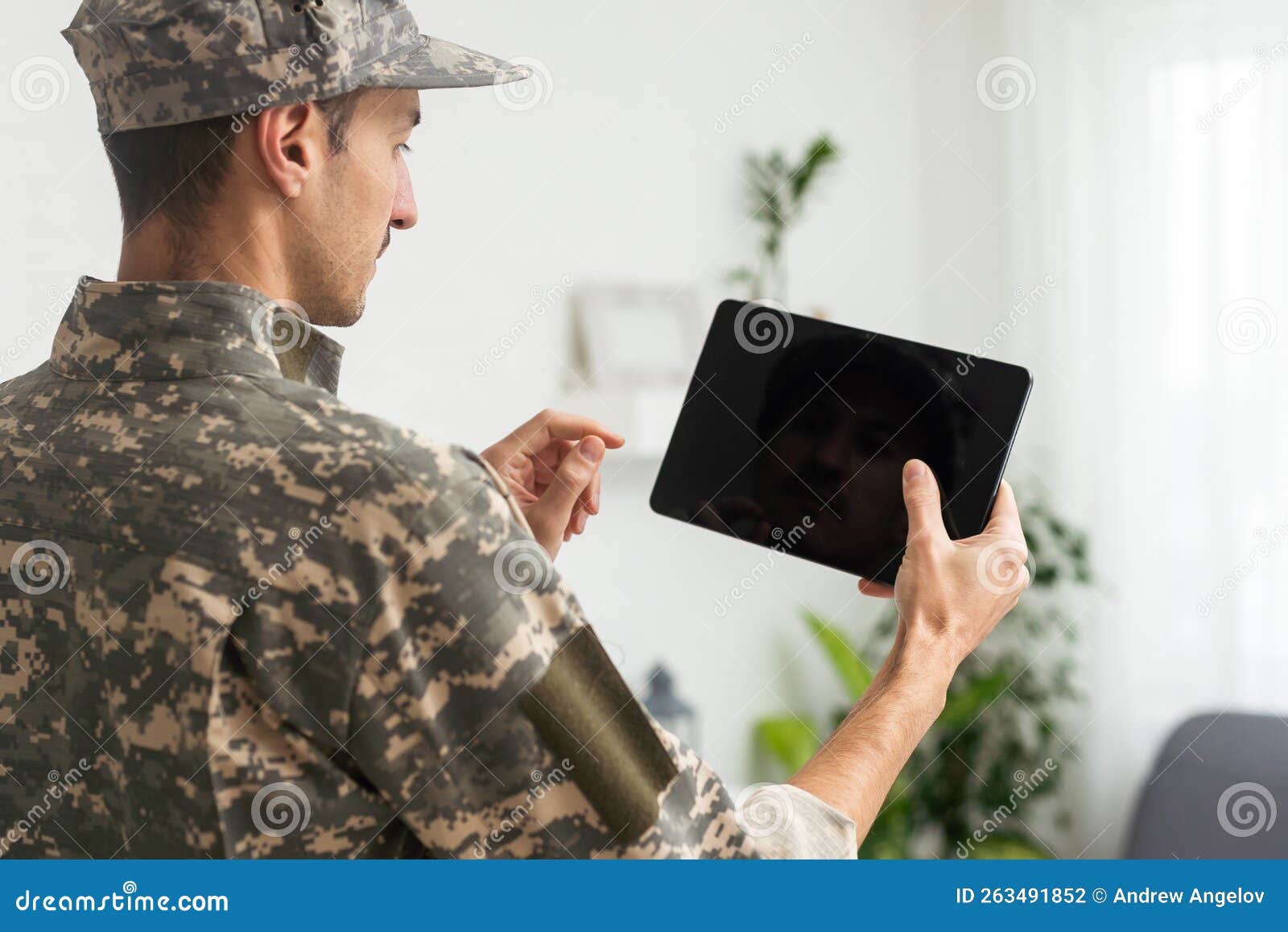 Male Soldier Using Tablet Computer on White Background. Military ...