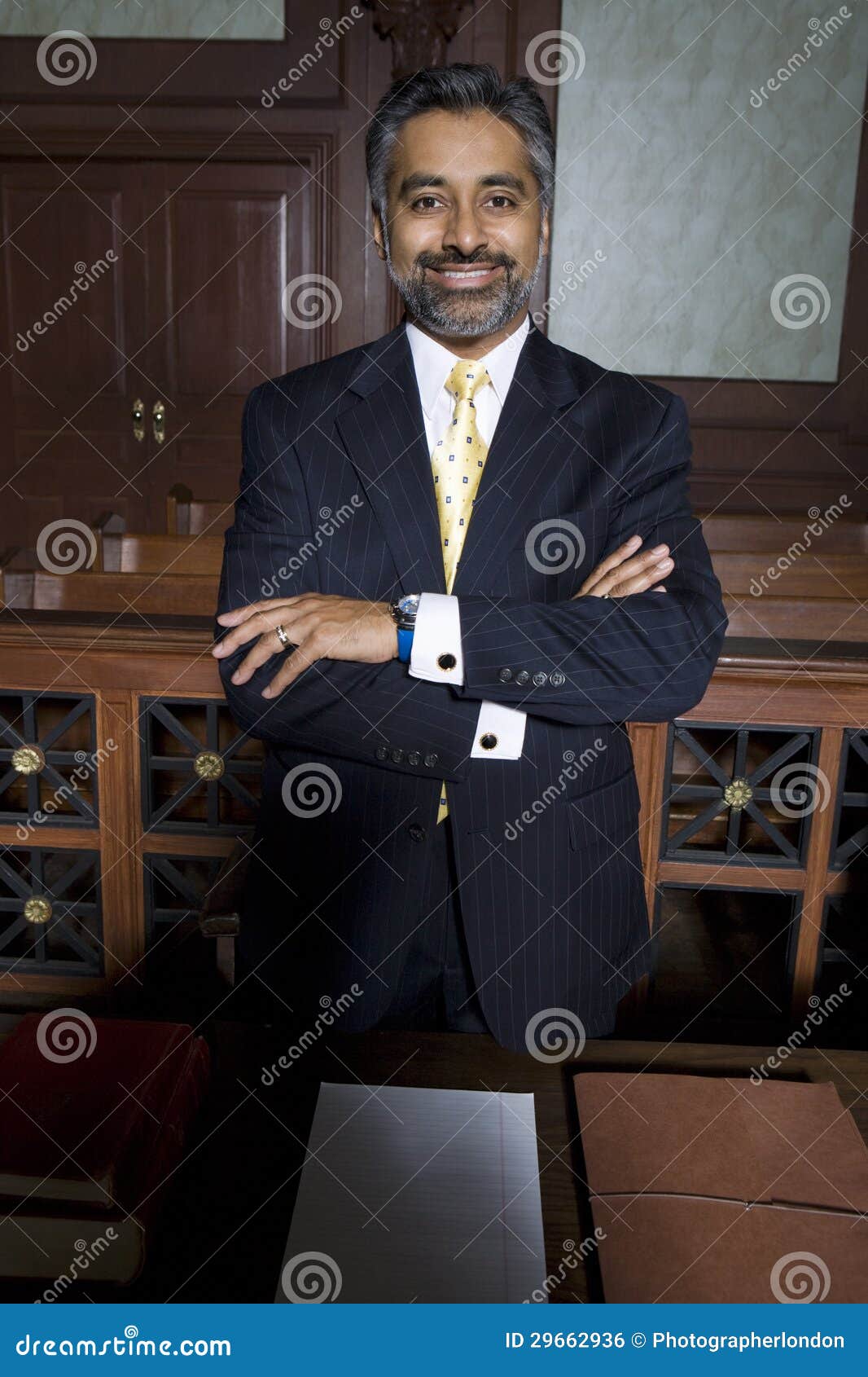 Male Solicitor Standing in Courthouse Stock Photo - Image of document ...