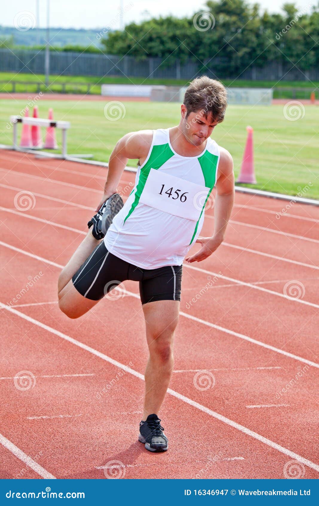 Male Sprinter Stretching before a Race Stock Image - Image of speed ...