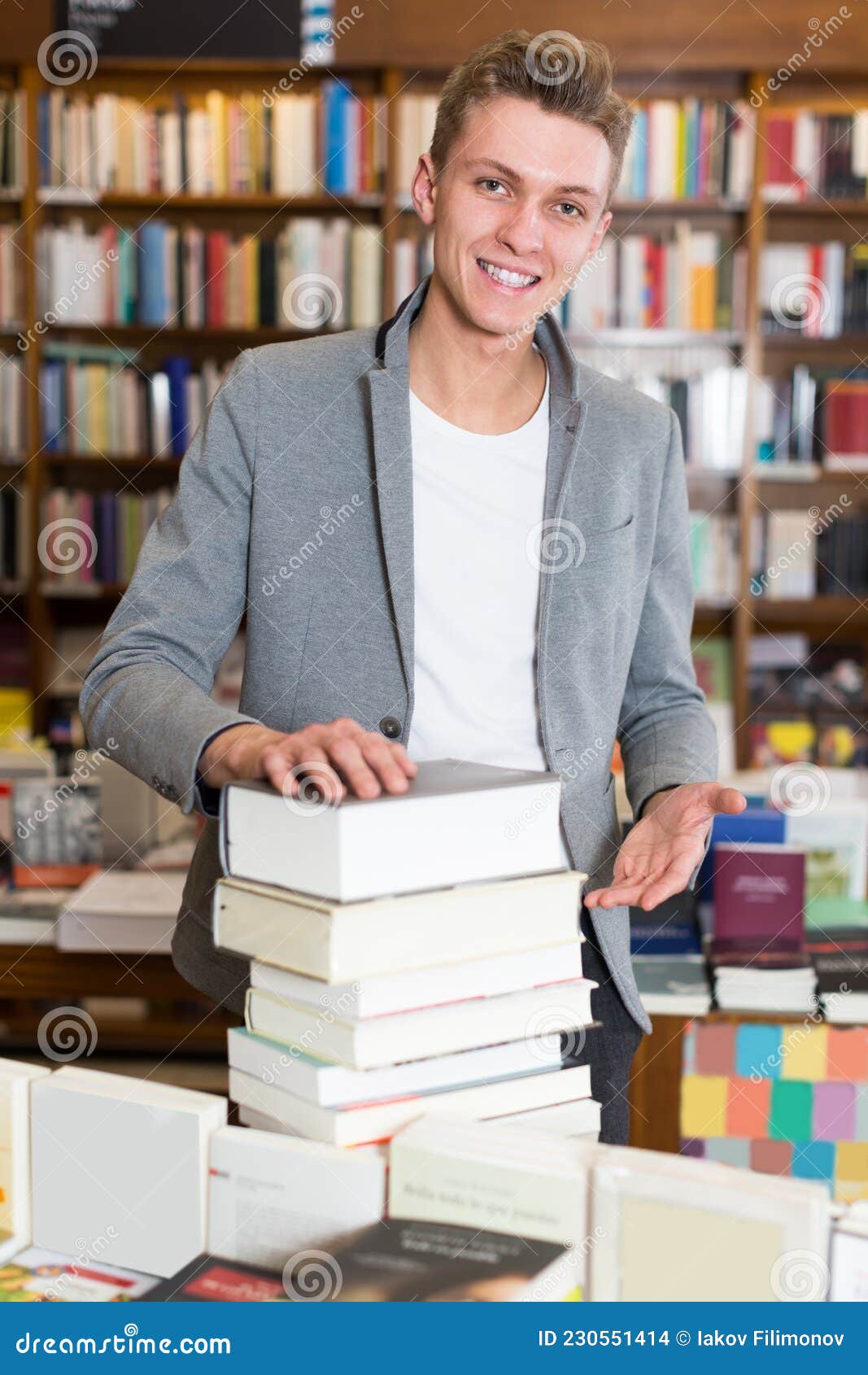 Male with Stack of Textbooks Stock Photo - Image of literature ...