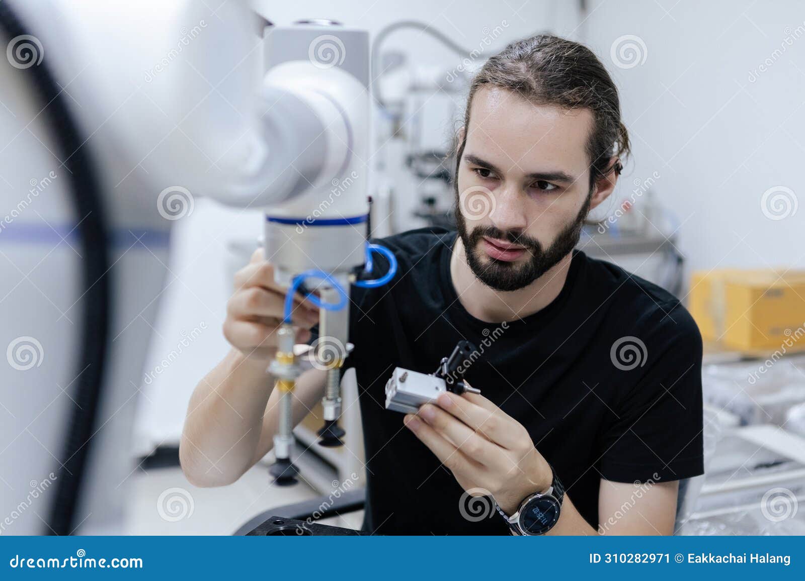 Male Staff Engineer with Robot for Education at Class Room. Education ...