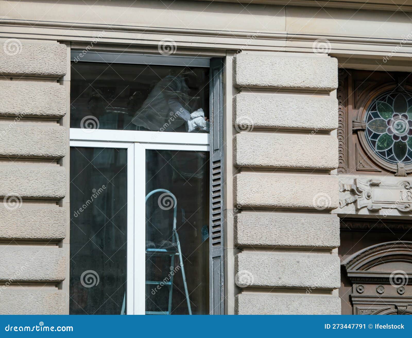 Male on Staircase Washing the Window Cleaning from Inside Stock Image ...