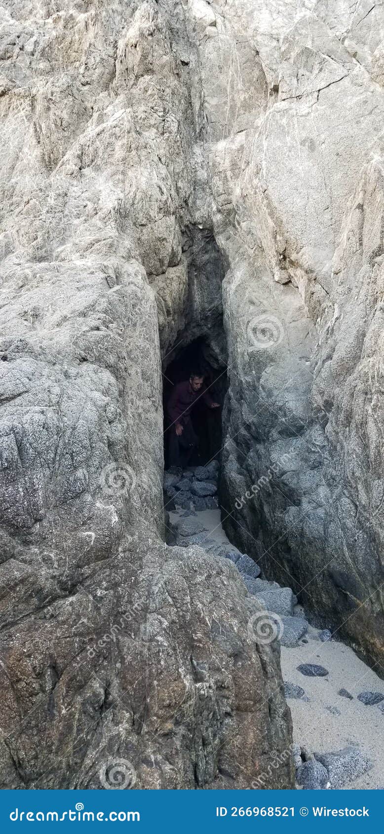 Male Standing between Rocks Stock Image - Image of male, cave: 266968521