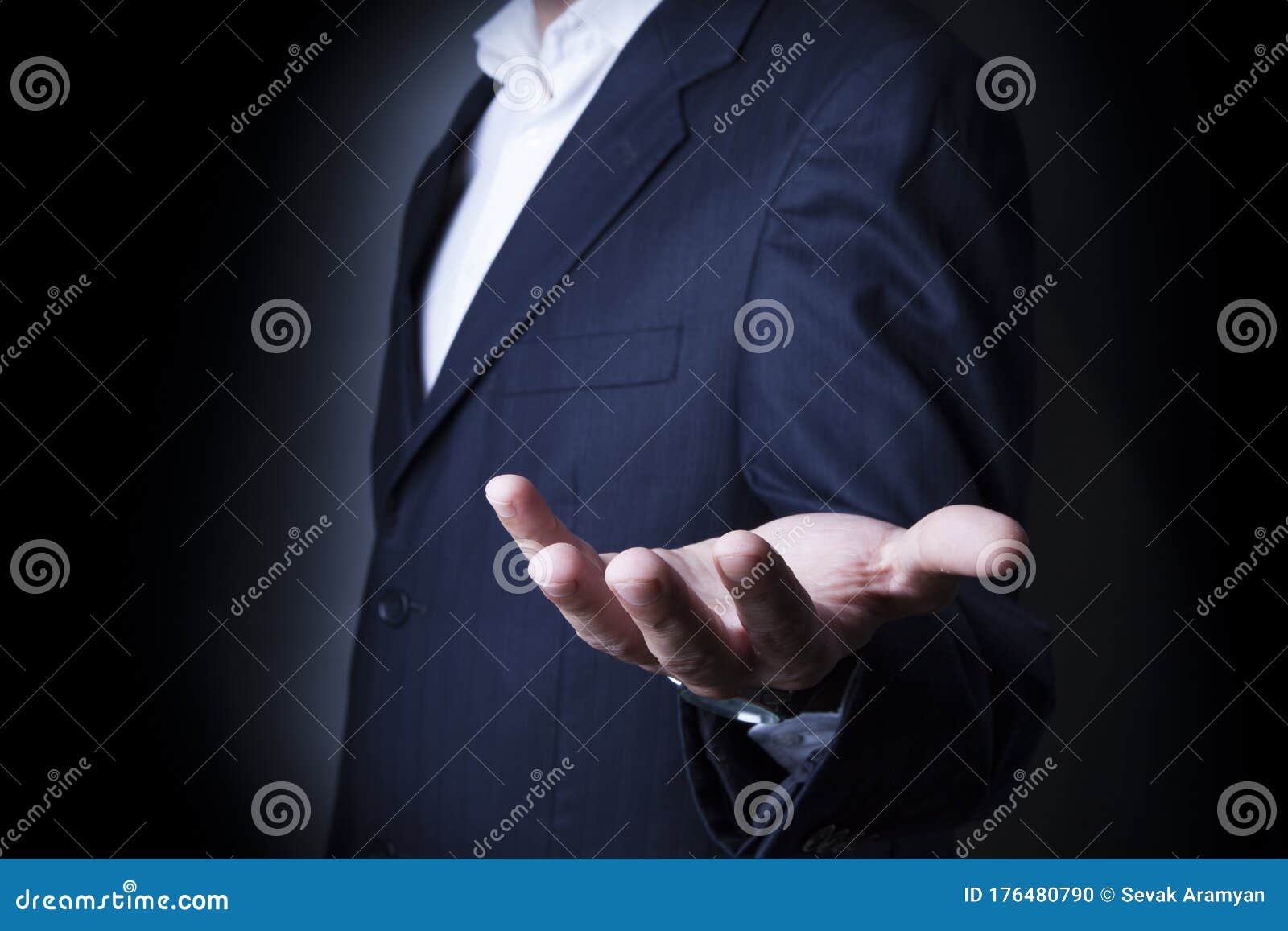 Male is Standing and Shows Outstretched Hand with Open Palm Stock Photo ...