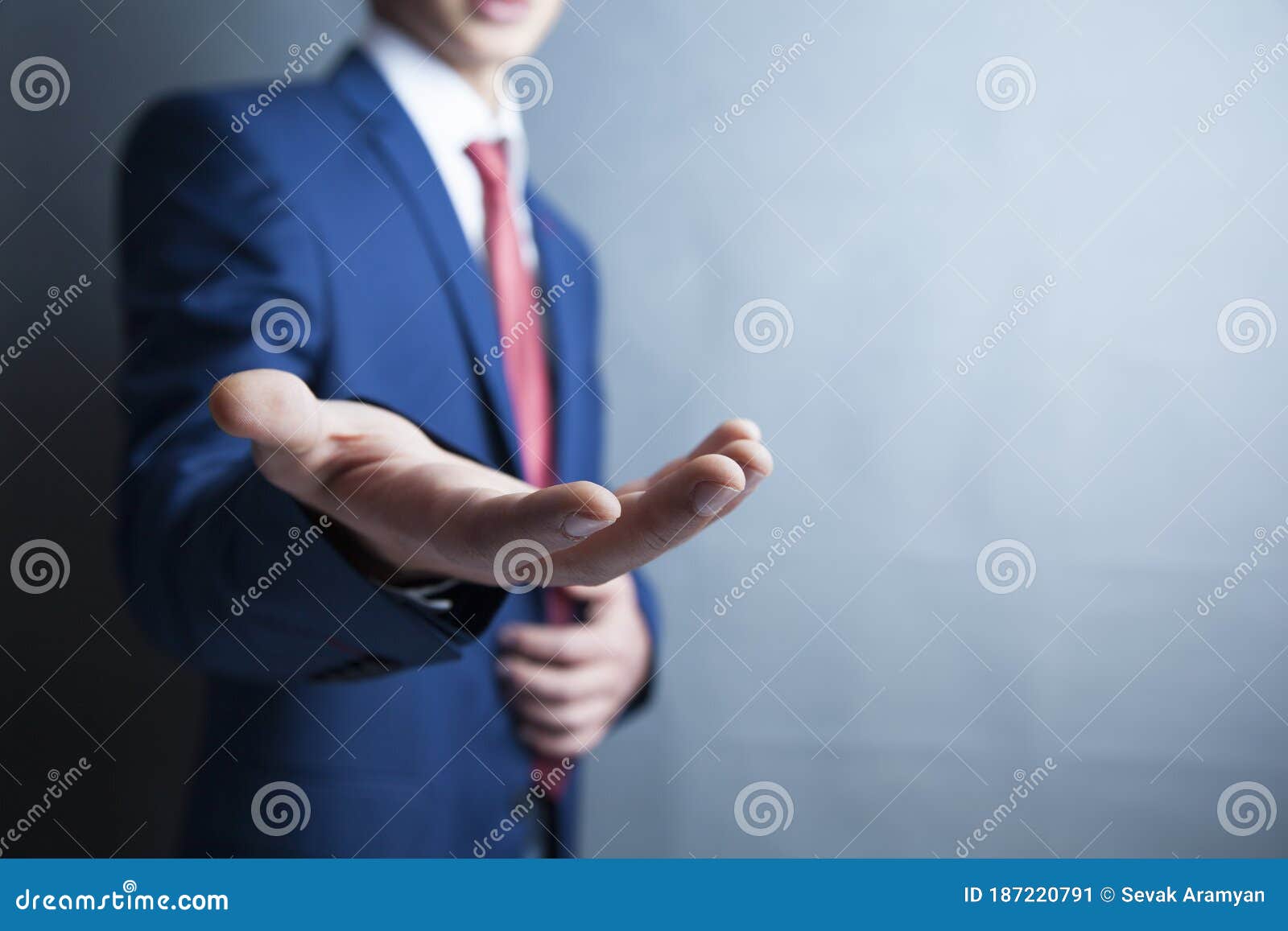 Male is Standing and Shows Outstretched Hand with Open Palm Stock Image ...