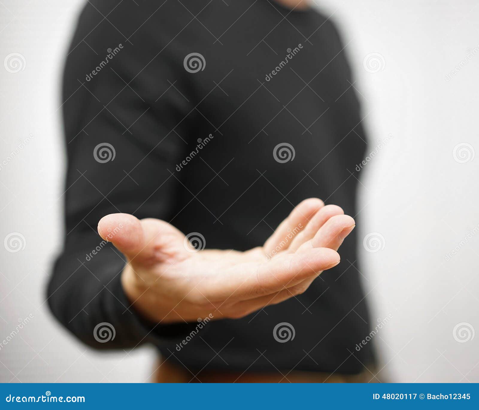 Male is Standing and Shows Outstretched Hand with Open Palm Stock Image ...