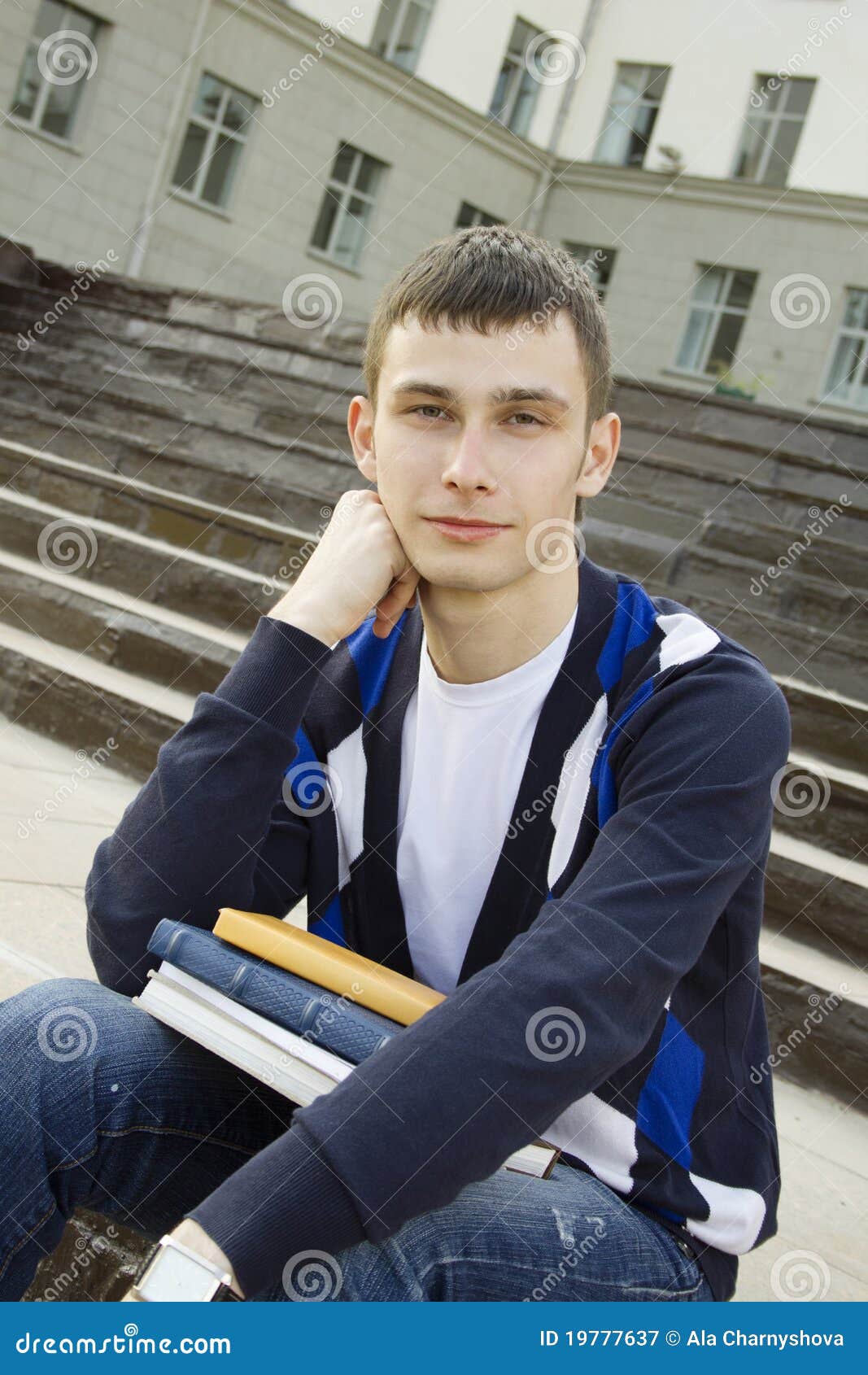 Male Student on Campus with Textbooks Stock Image - Image of indoor ...