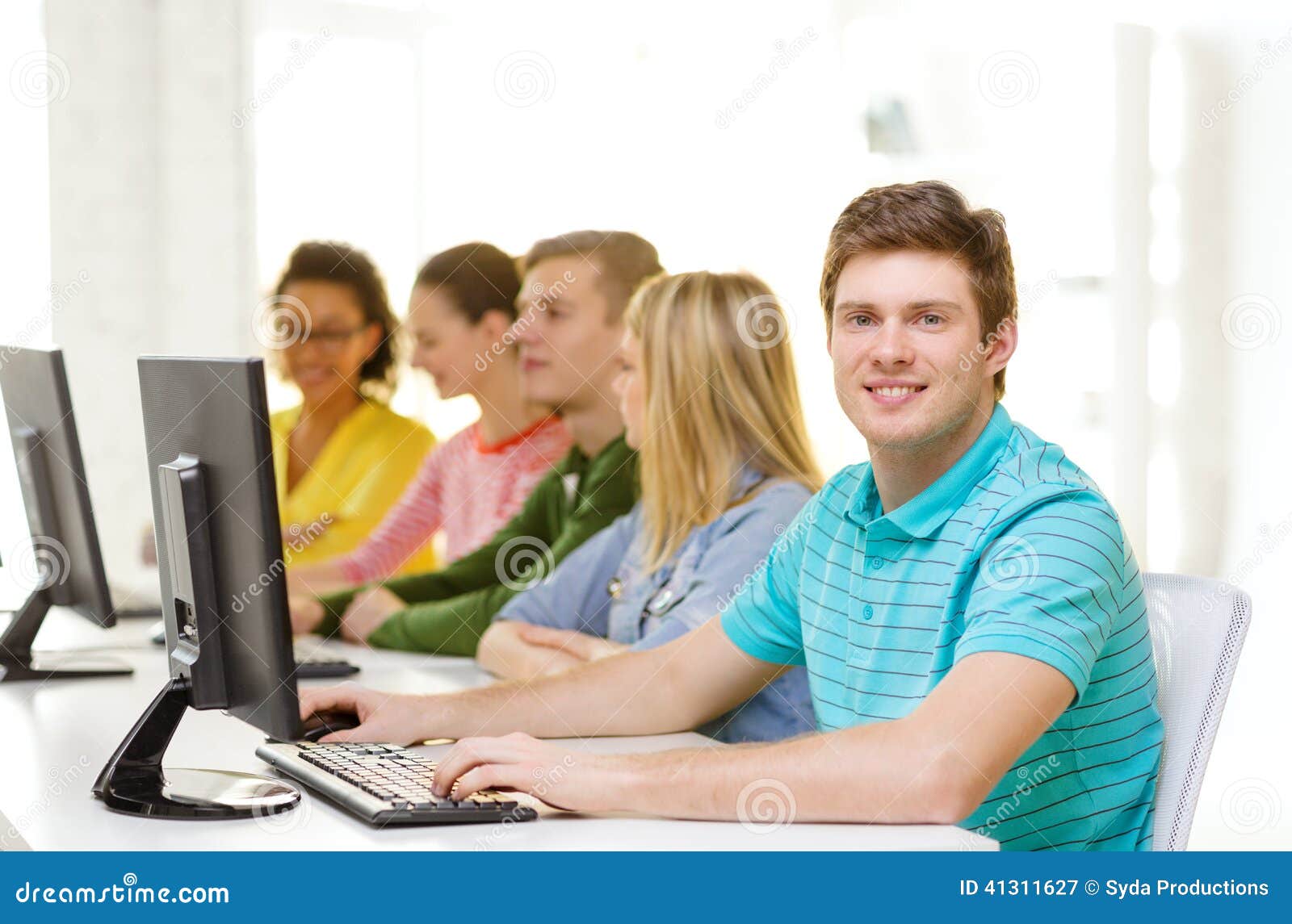 Male Student with Classmates in Computer Class Stock Image - Image of ...