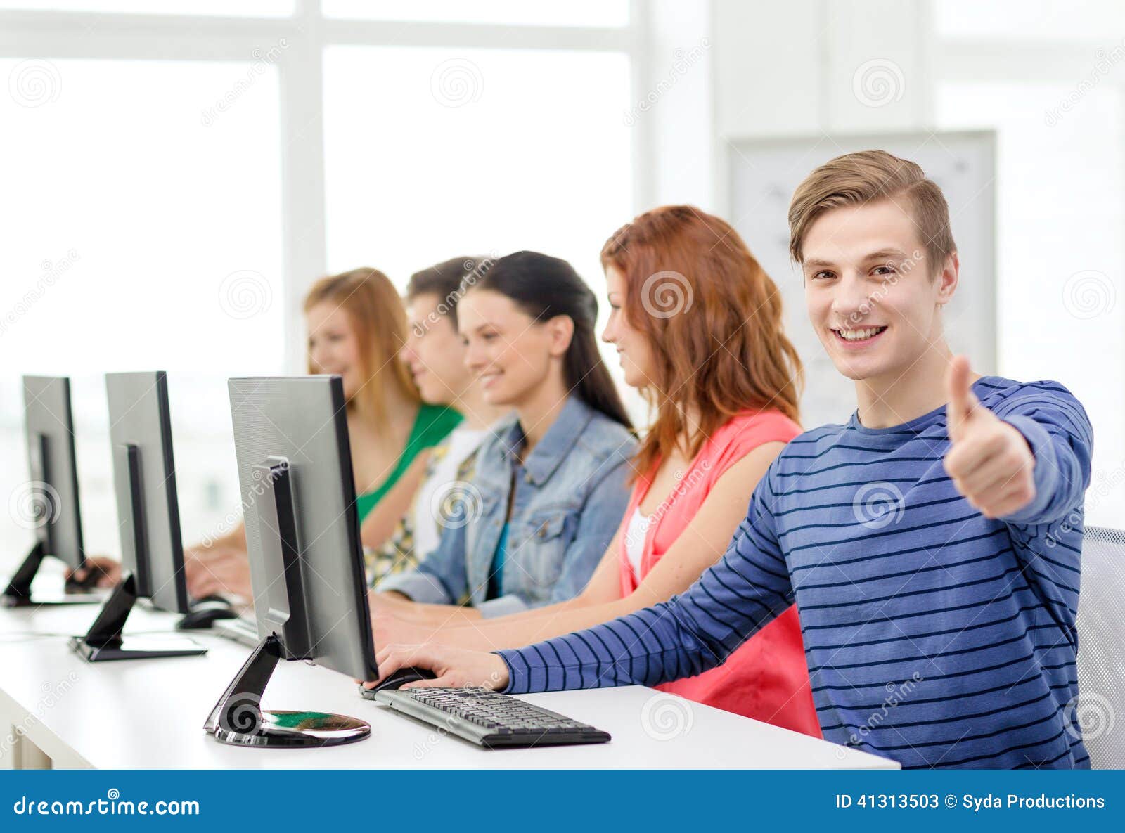 Male Student with Classmates in Computer Class Stock Image - Image of ...