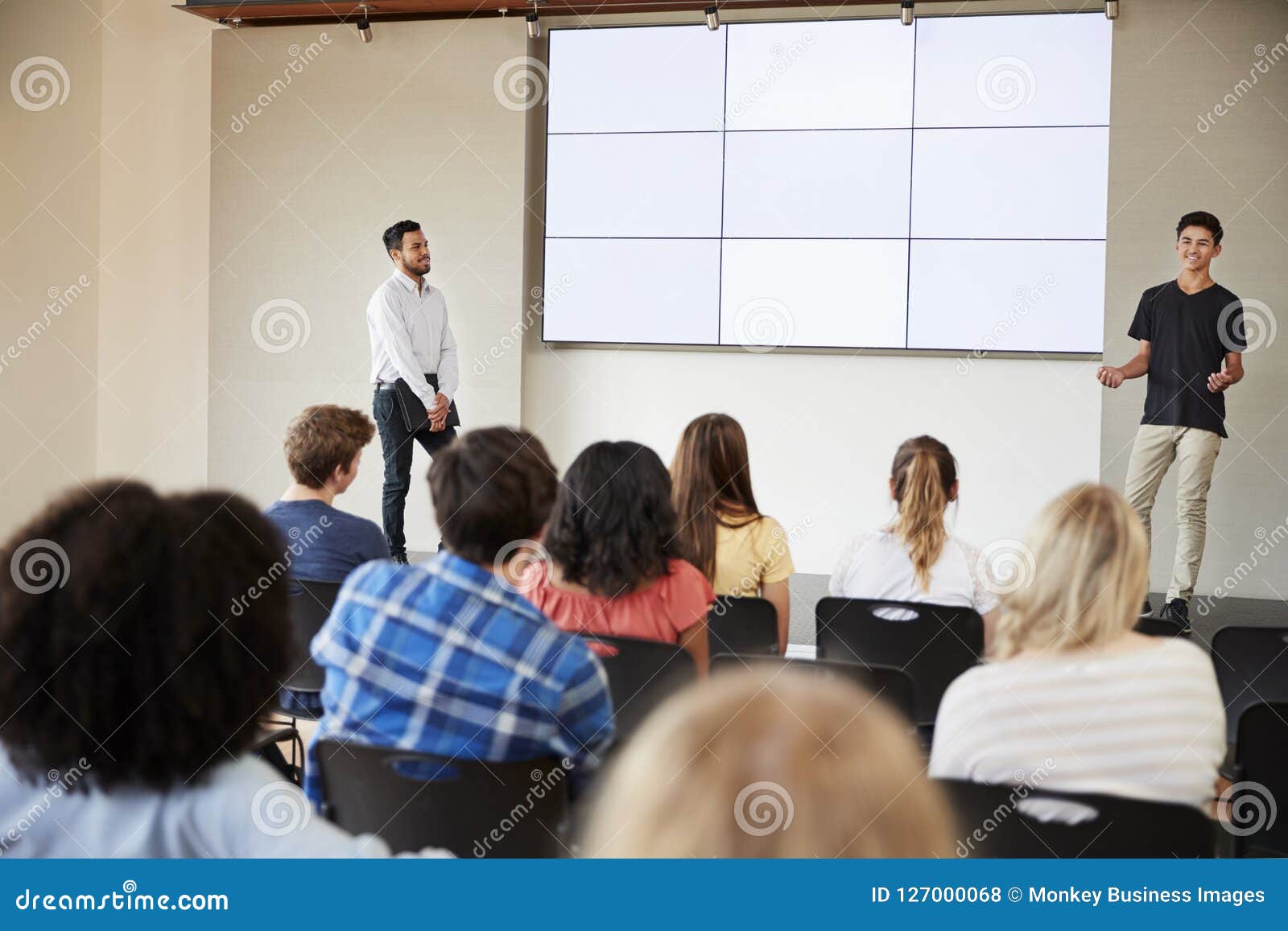 Male Student Giving Presentation To High School Class in Front of ...
