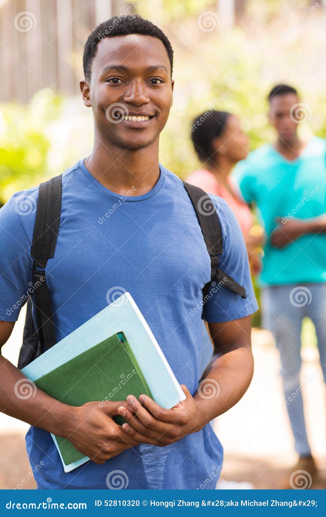 Male student holding books stock photo. Image of good - 52810320 Male student holding books stock photo. Image of good - 52810320