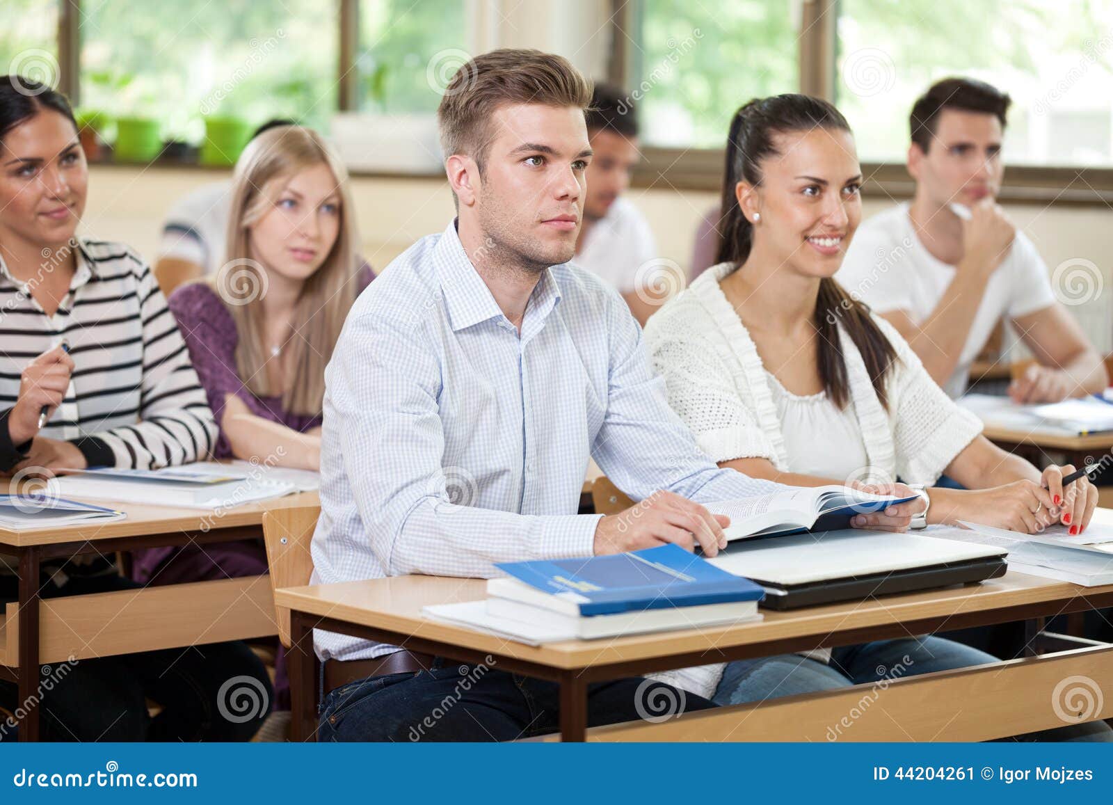 Male Student Listening a Lecture in Classroom Stock Image - Image of ...