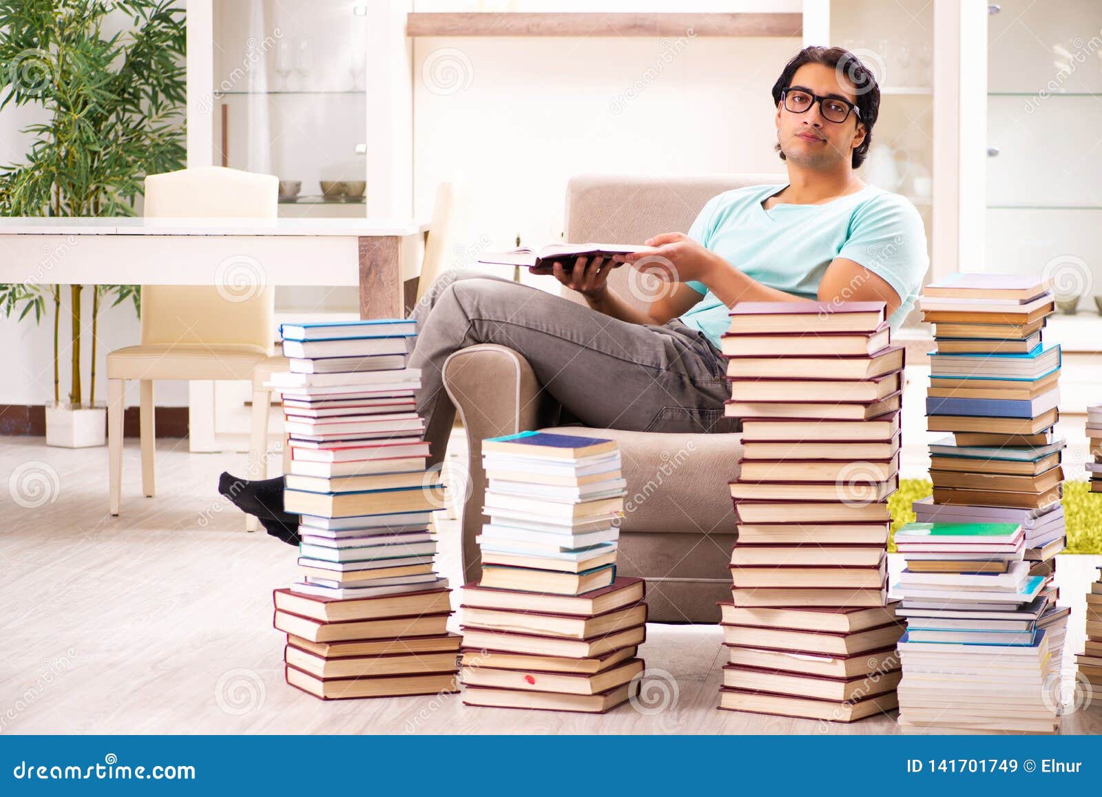 The Male Student with Many Books at Home Stock Image - Image of ...