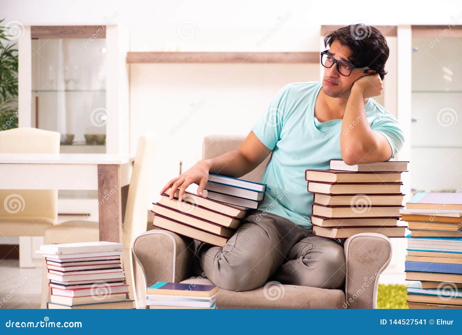 The Male Student with Many Books at Home Stock Image - Image of ...