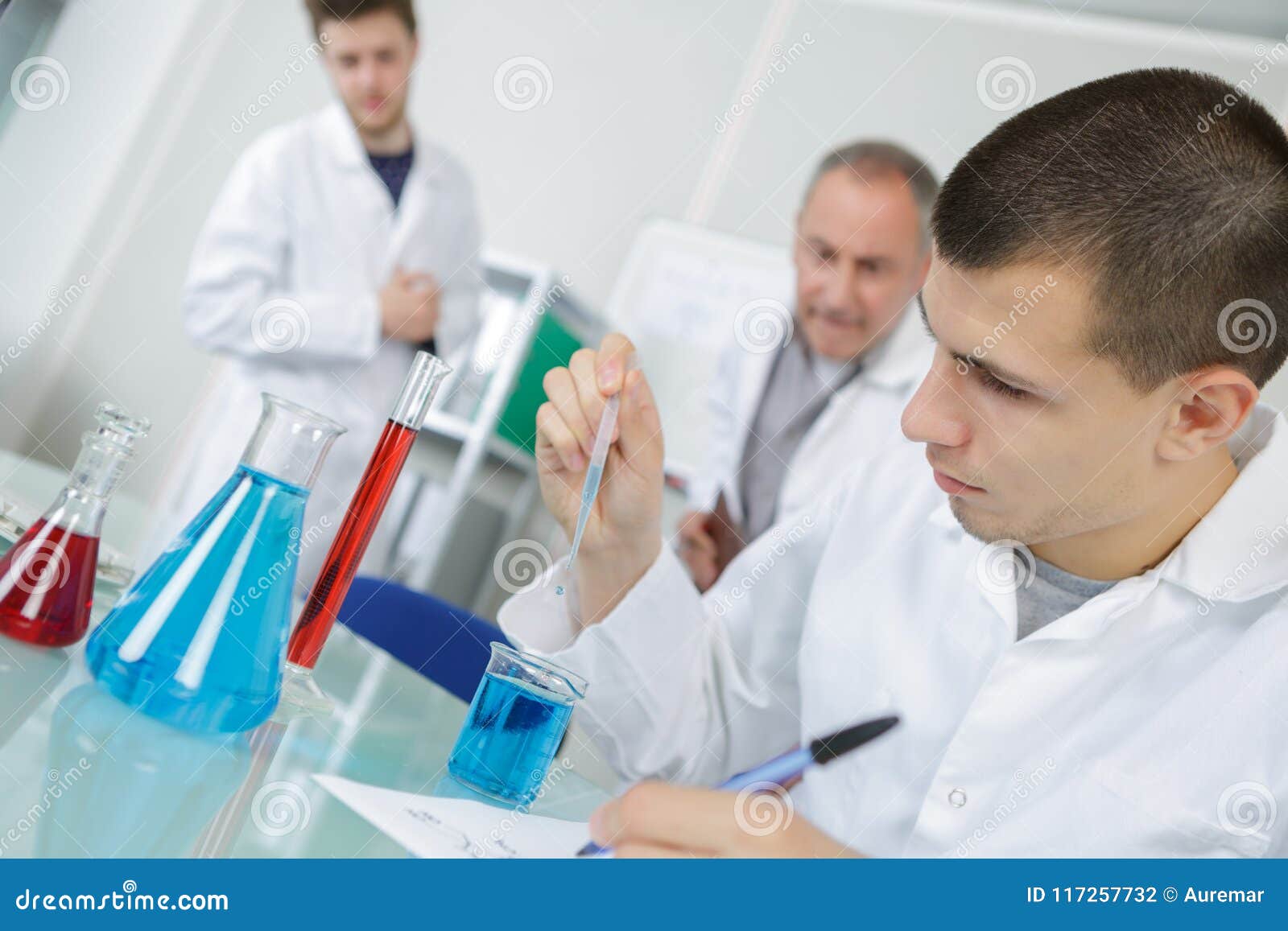 Male Student Performing Science Experiment Stock Photo - Image of flask ...