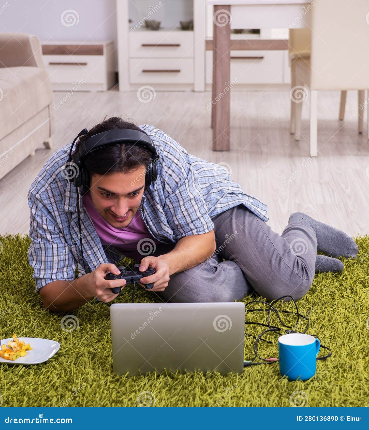 Young Male Student Playing Computer Games at Home Stock Photo - Image ...